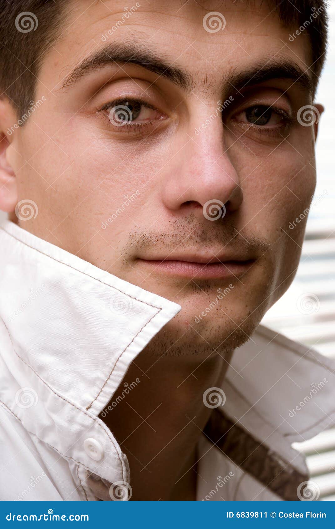 Handsome man stock image. Image of expressive, shirt, watching - 6839811