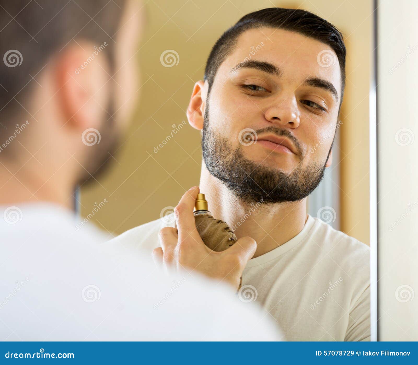 Handsome Man Applying Perfum Stock Image - Image of looking, ordinary ...
