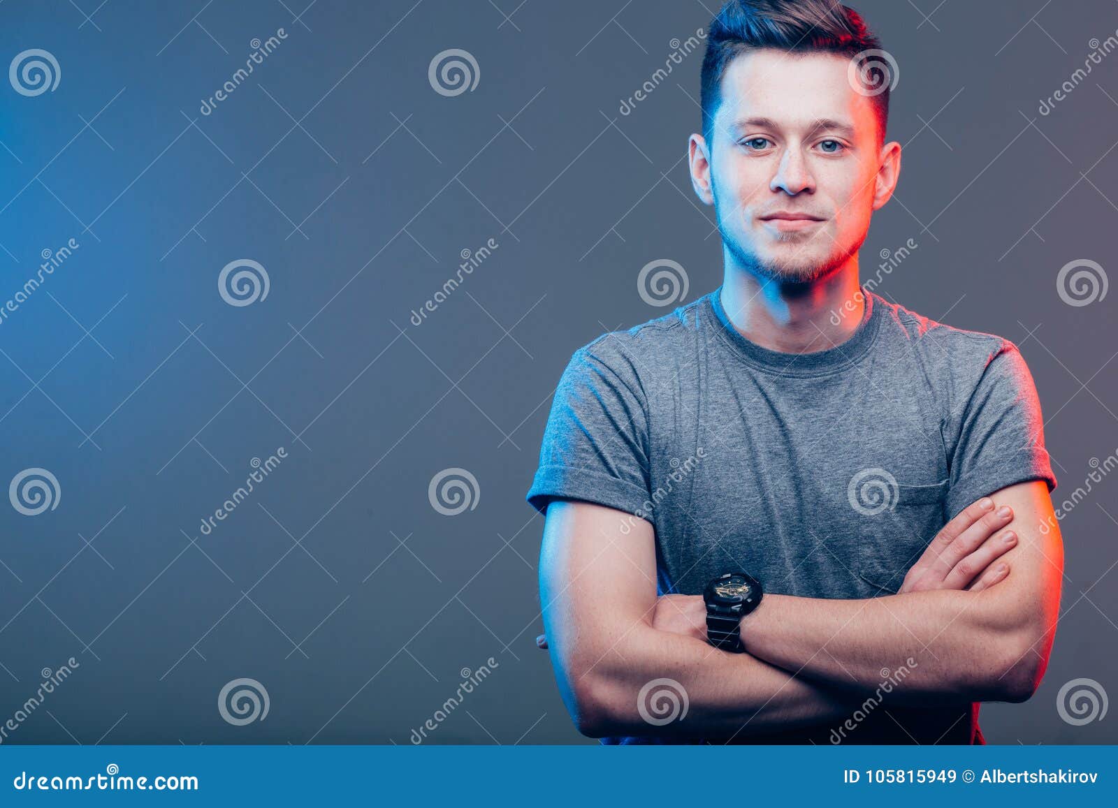 Handsome Man with Arms Folded Looking at Camera Stock Image - Image of ... Handsome Man with Arms Folded Looking at Camera Stock Image - Image of ...