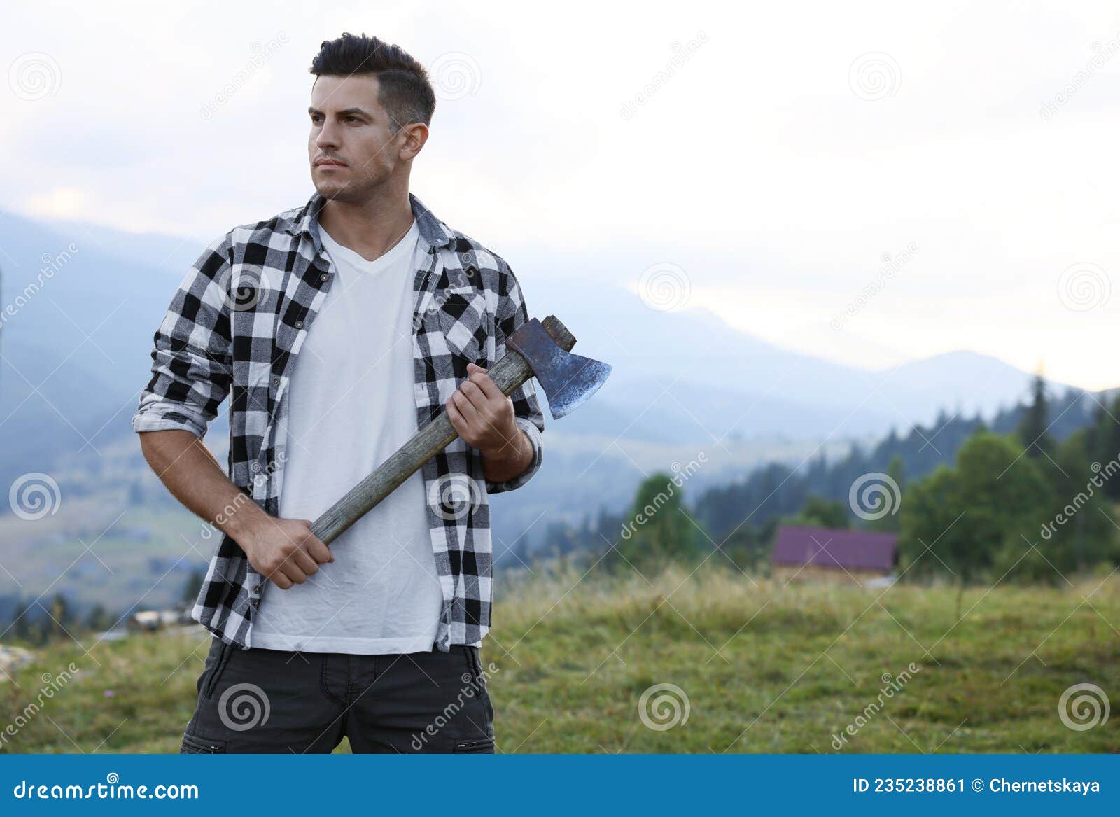 Handsome Man with Axe in Mountains, Space for Text Stock Image - Image ...