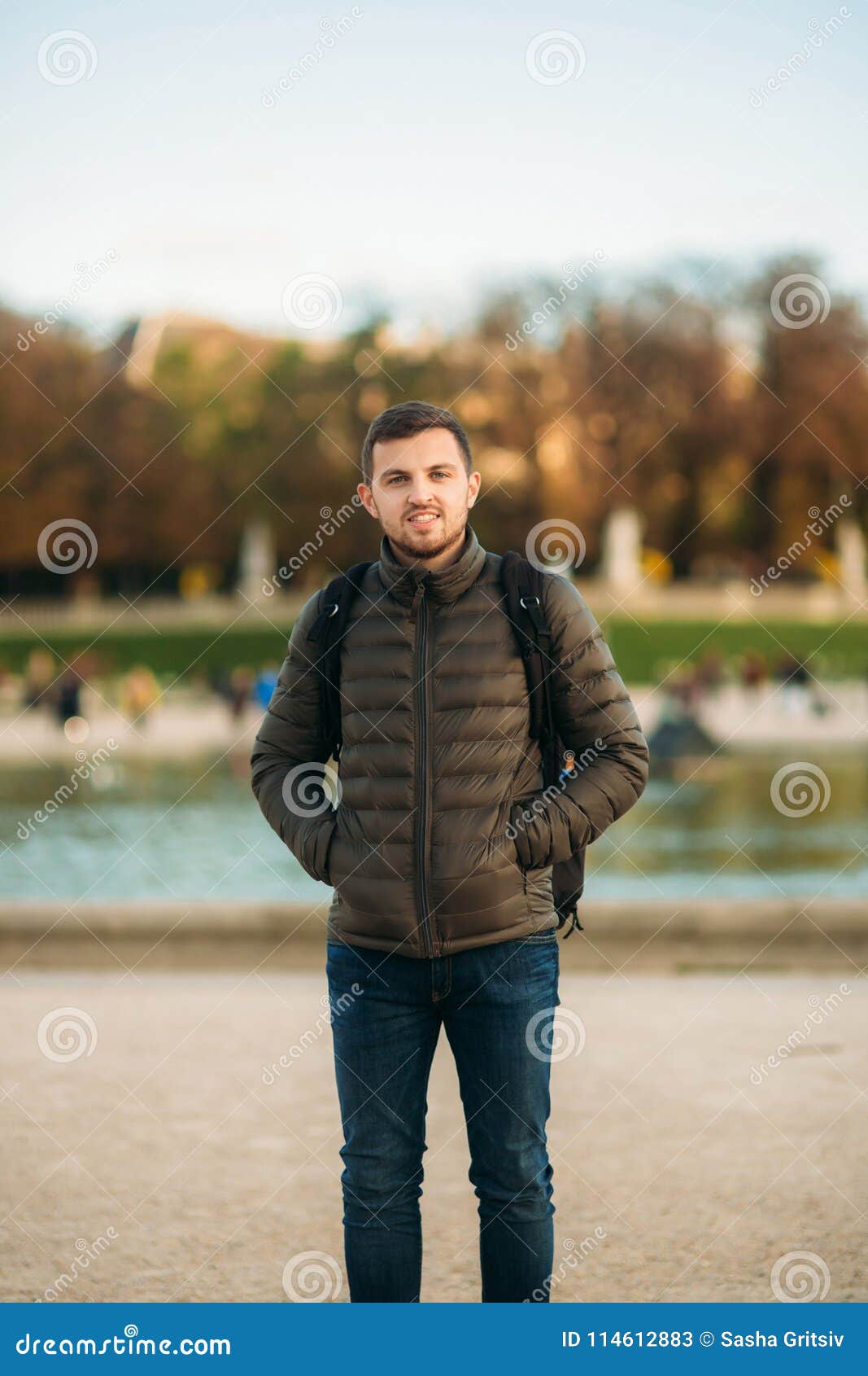 Handsome Man with Backpack Posing for Photographer in Pakr Stock Image ...