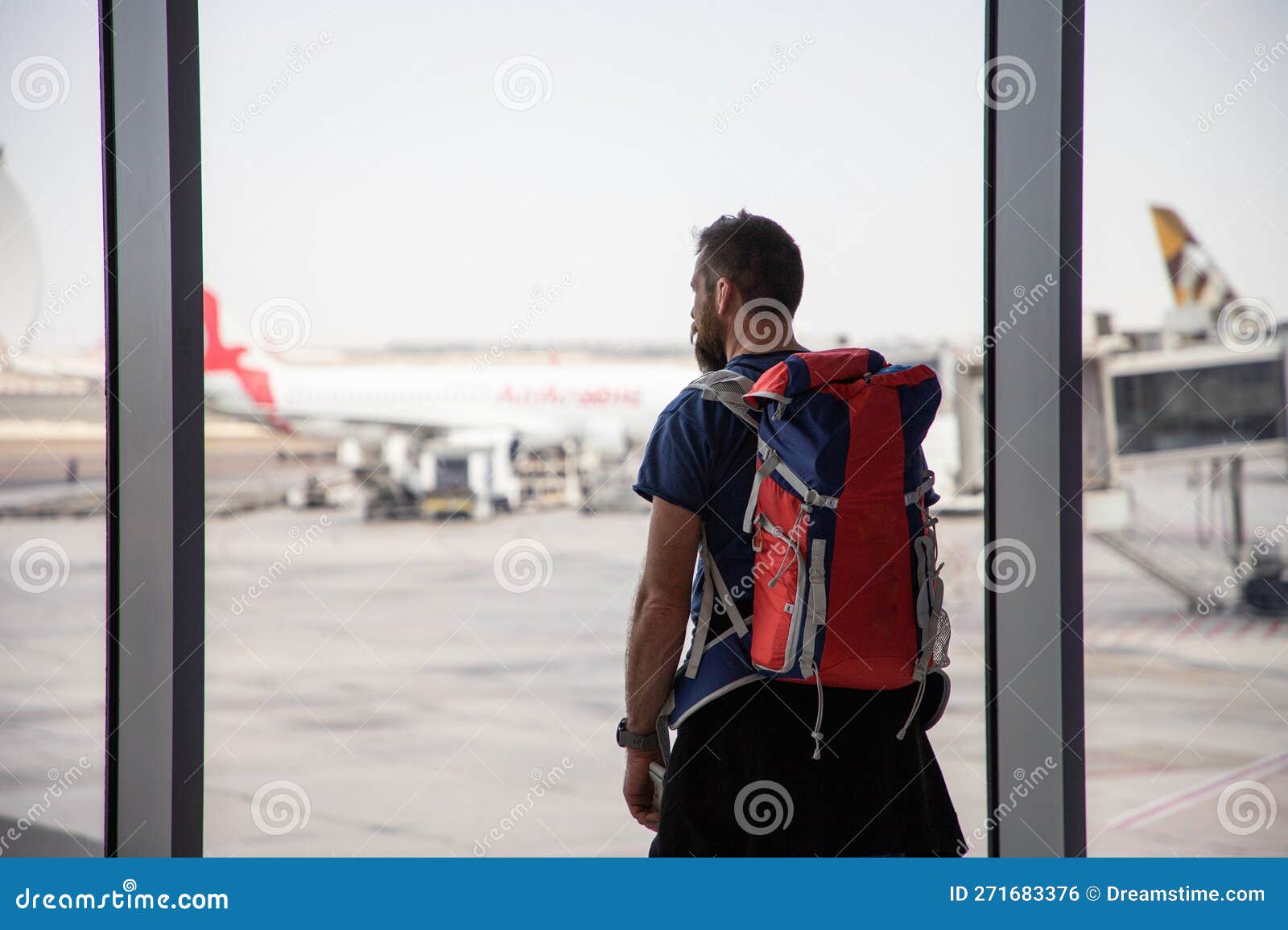 Handsome Man with Backpack Waiting in Airport Stock Photo - Image of ...