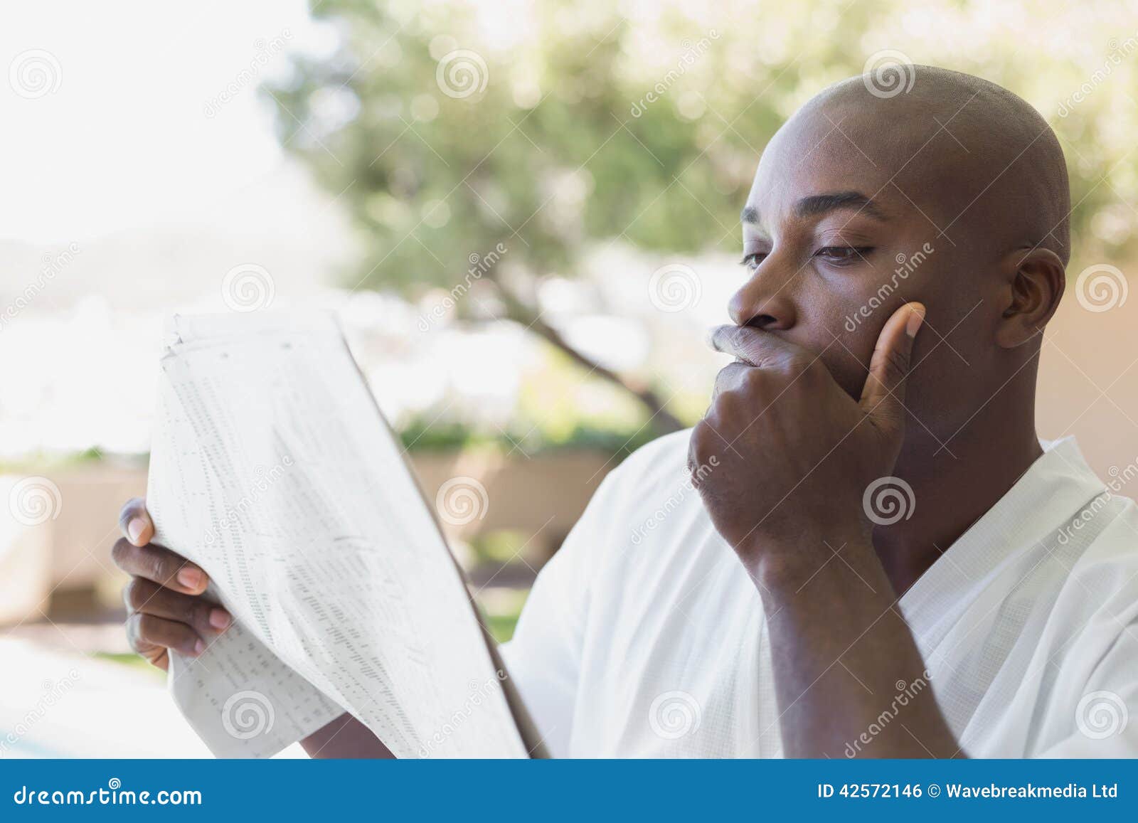 Handsome Man in Bathrobe Reading Newspaper Outside Stock Photo - Image ...