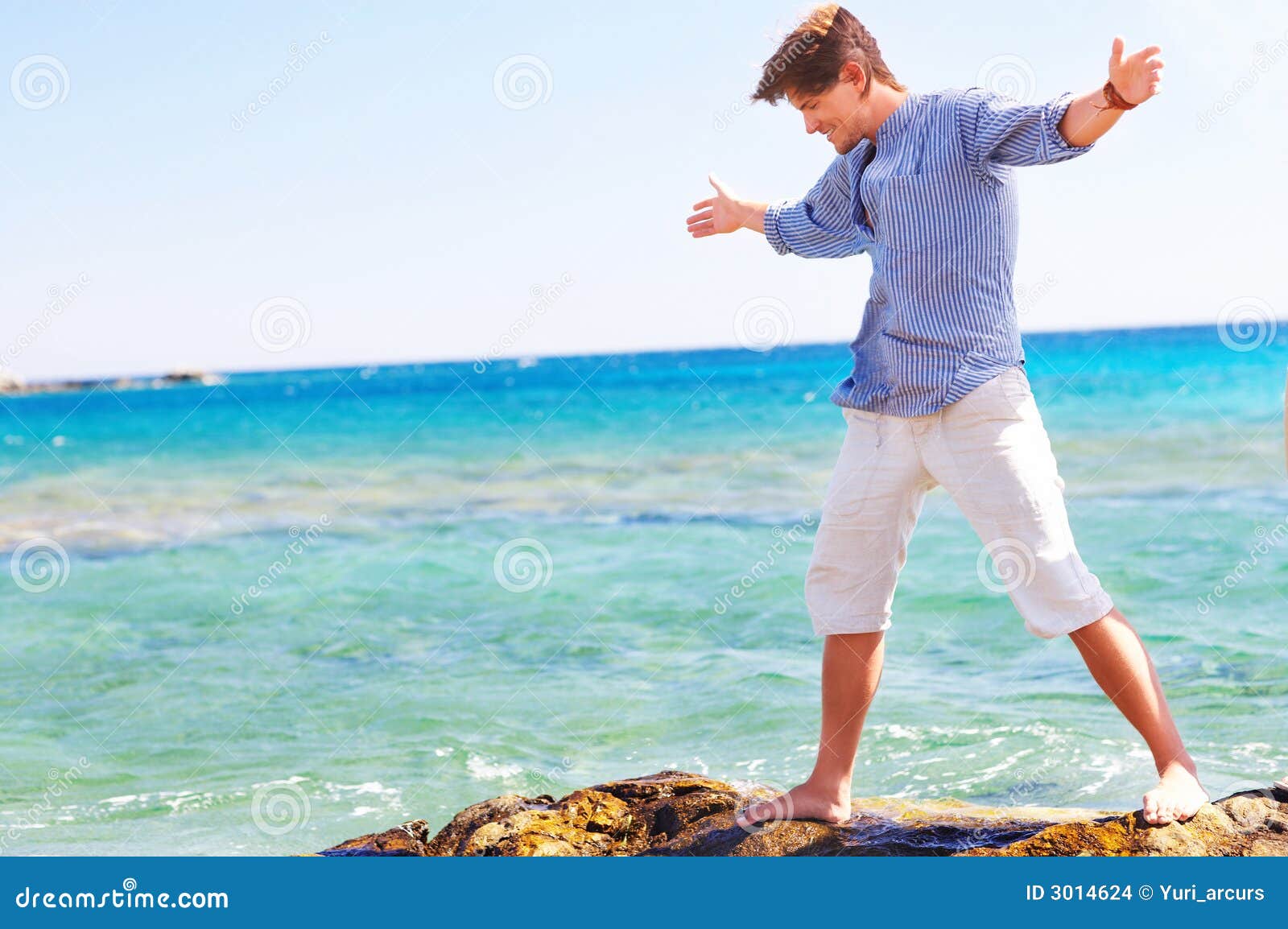 Handsome man at the beach stock photo. Image of happy - 3014624