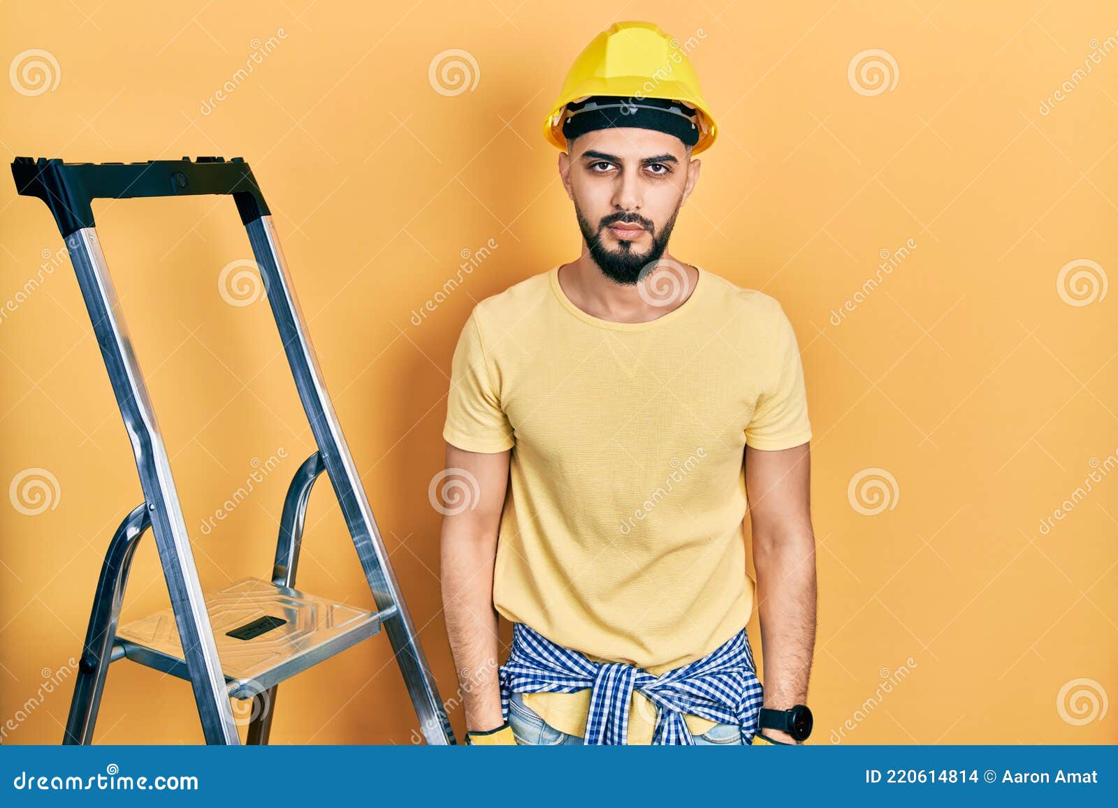 Relaxed Construction Worker With Yellow Helmet Stock Photo ...