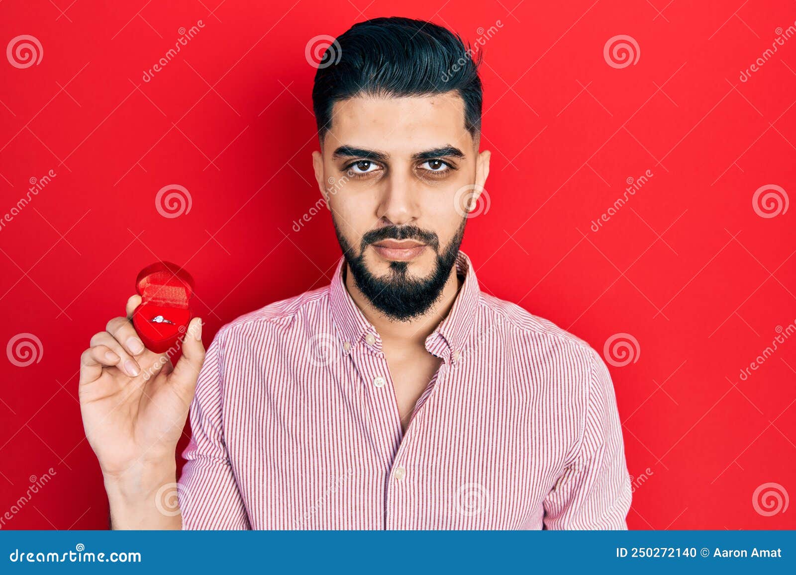 Handsome Man with Beard Holding Engagement Ring for Proposal Thinking ...