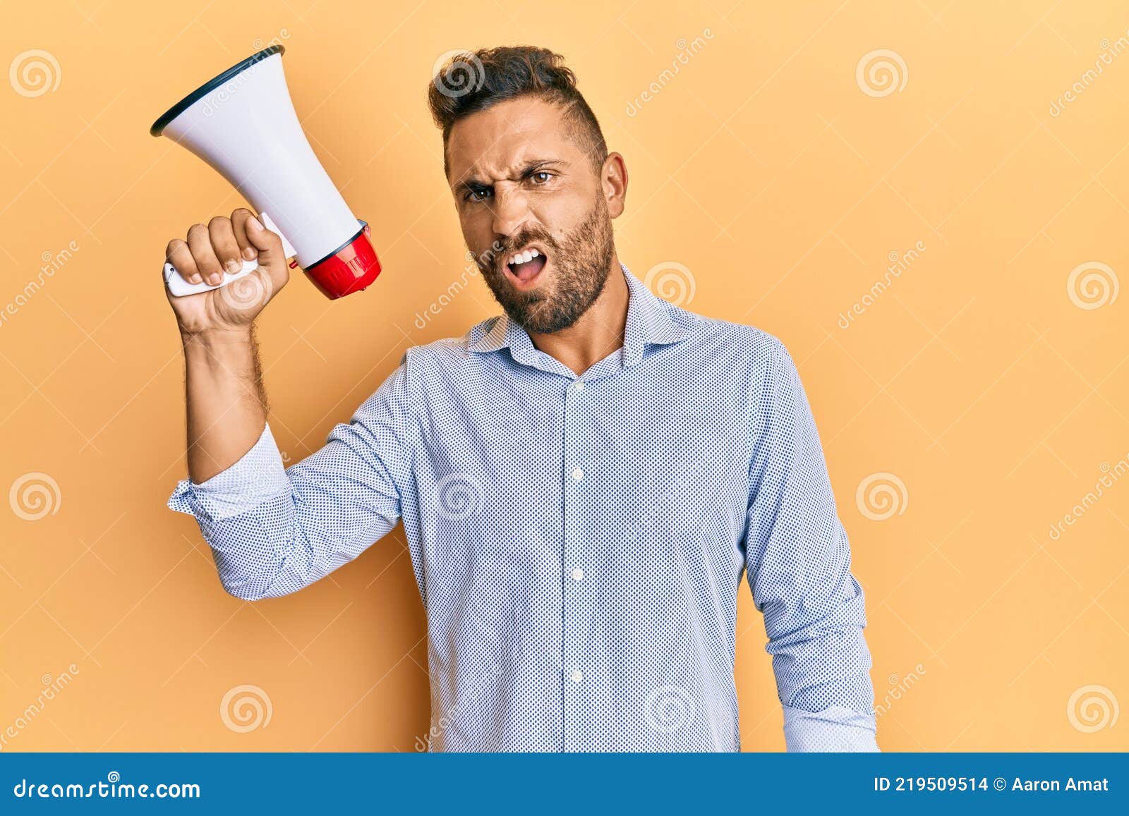 Handsome Man with Beard Shouting through Megaphone in Shock Face ...