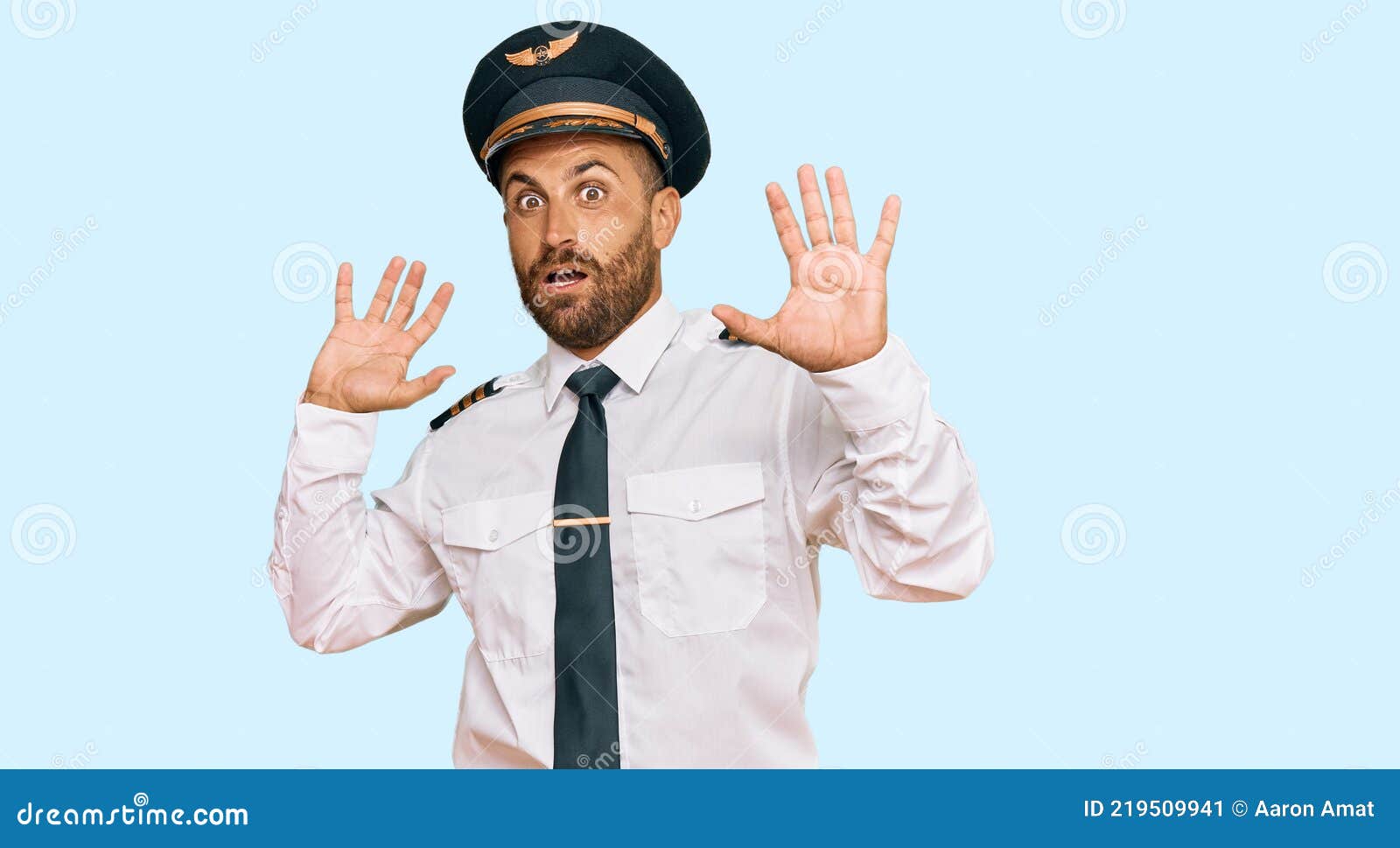 Handsome Man with Beard Wearing Airplane Pilot Uniform Afraid and ...