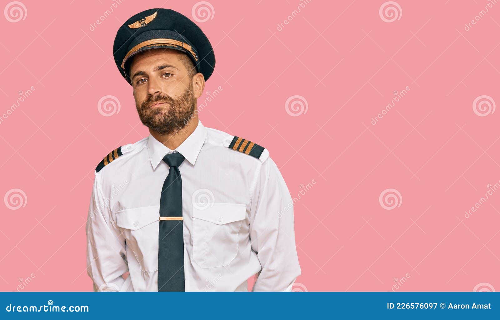 Handsome Man With Beard Wearing Airplane Pilot Uniform Depressed And