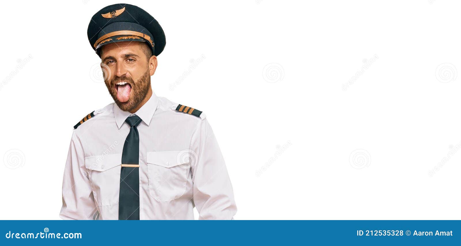 Handsome Man With Beard Wearing Airplane Pilot Uniform Sticking Tongue