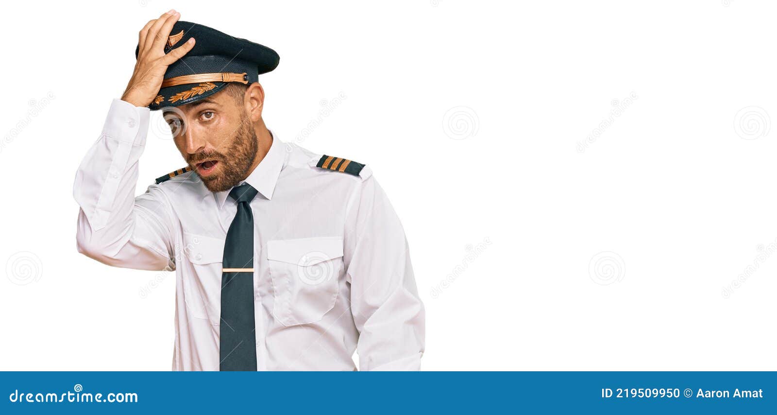 Handsome Man with Beard Wearing Airplane Pilot Uniform Surprised with ...