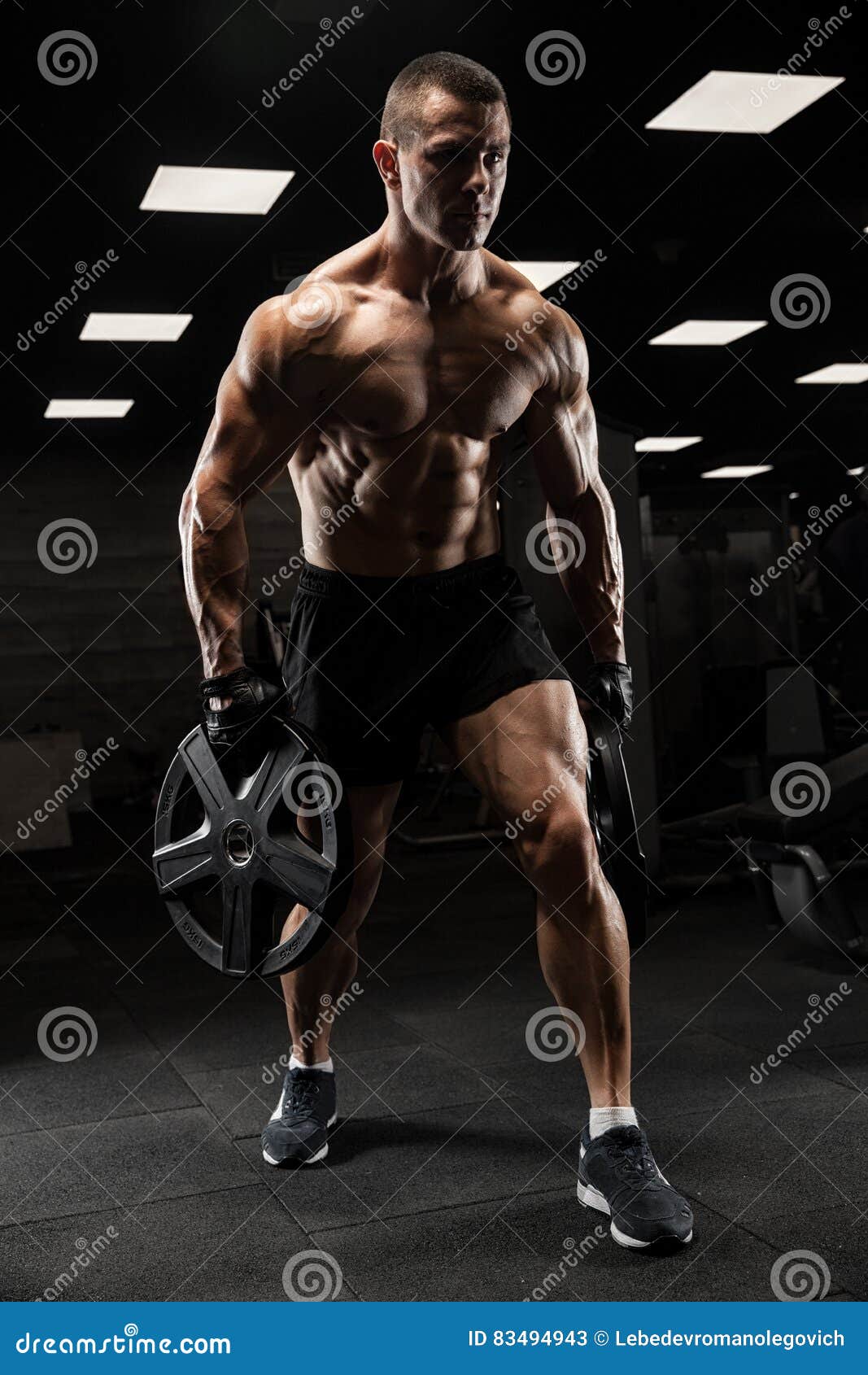 Handsome Man with Big Muscles, Posing at the Camera in the Gym Stock ...