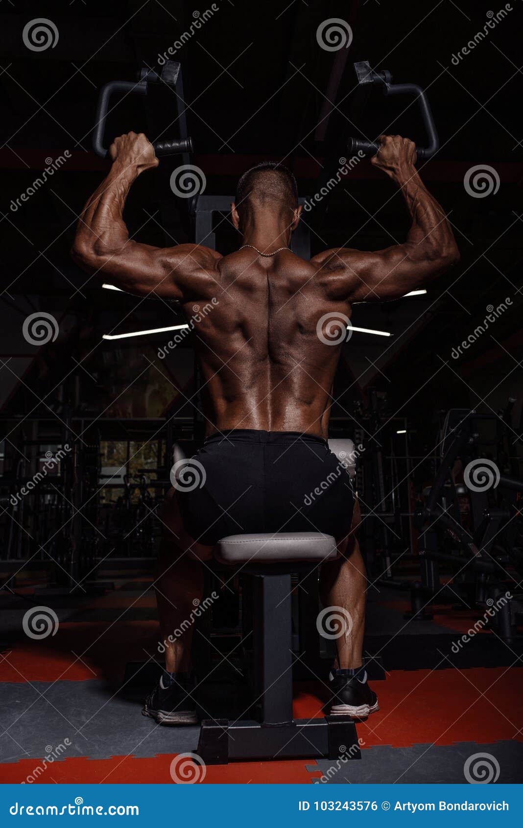 Handsome Man with Big Muscles Working Out in Gym. Muscular Bodybuilder ...