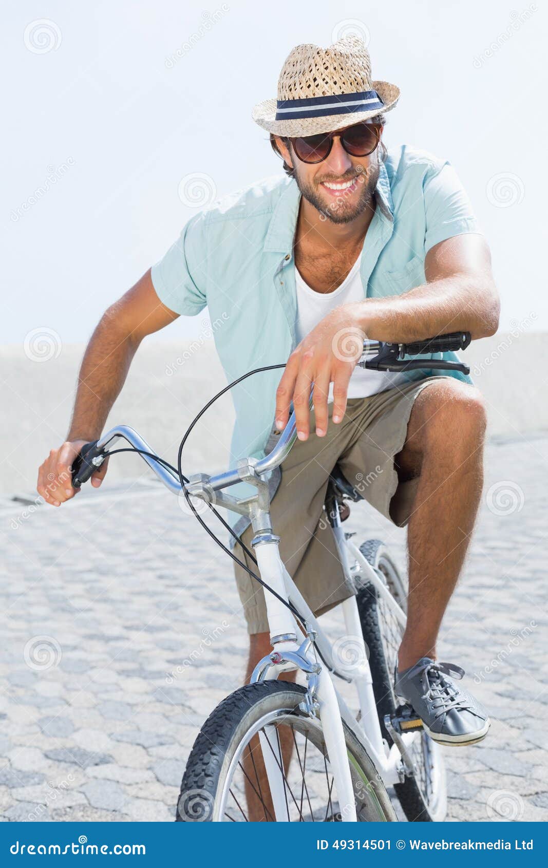 Handsome Man on a Bike Ride Stock Image - Image of male, cheerful: 49314501