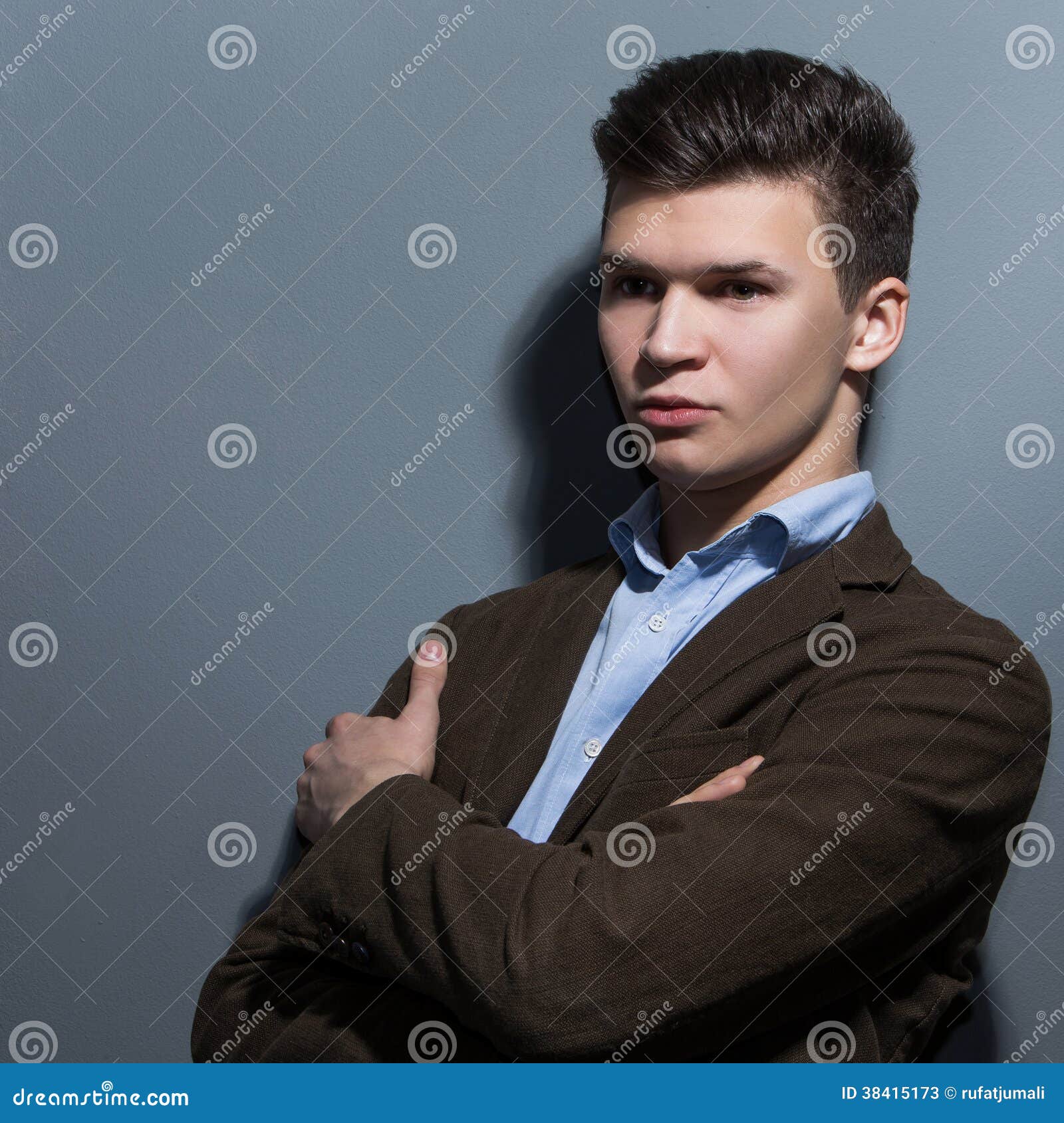 Handsome Man on Blue Background Stock Image - Image of hands, costume ...