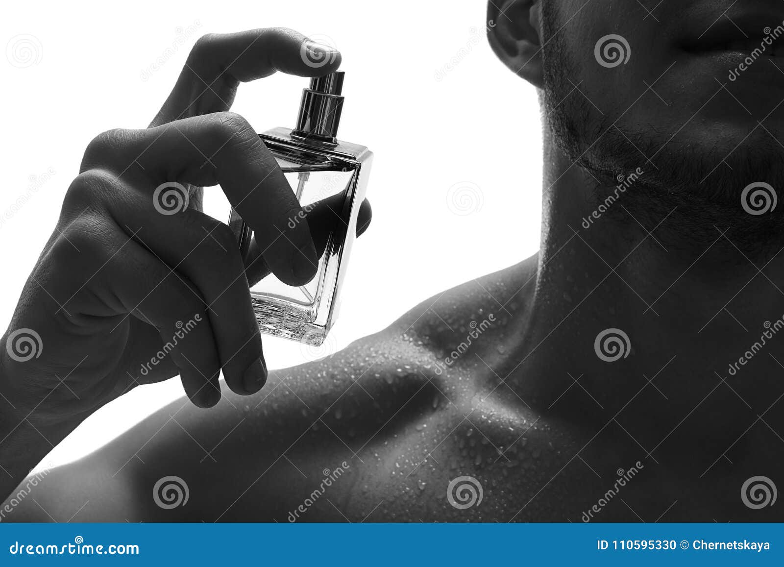 Handsome Man with Bottle of Perfume Stock Photo - Image of perfumery ...
