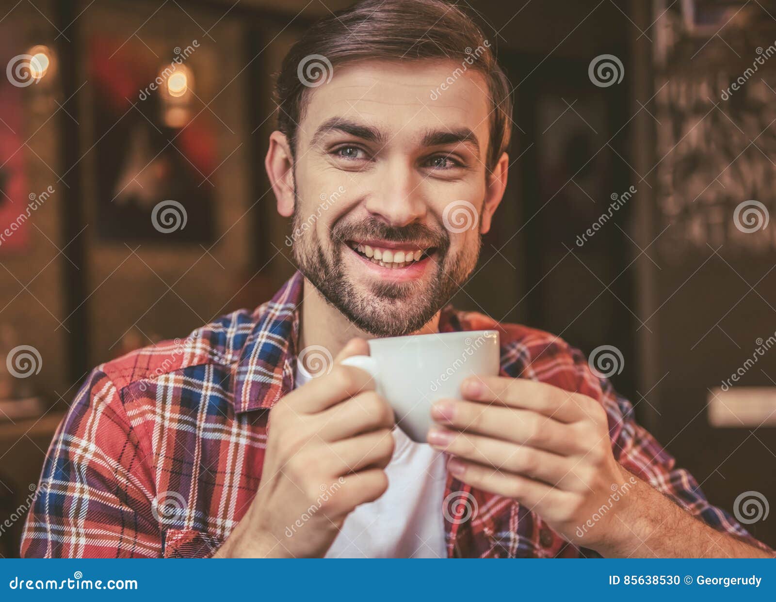 Handsome man at the cafe stock photo. Image of hope, drink - 85638530