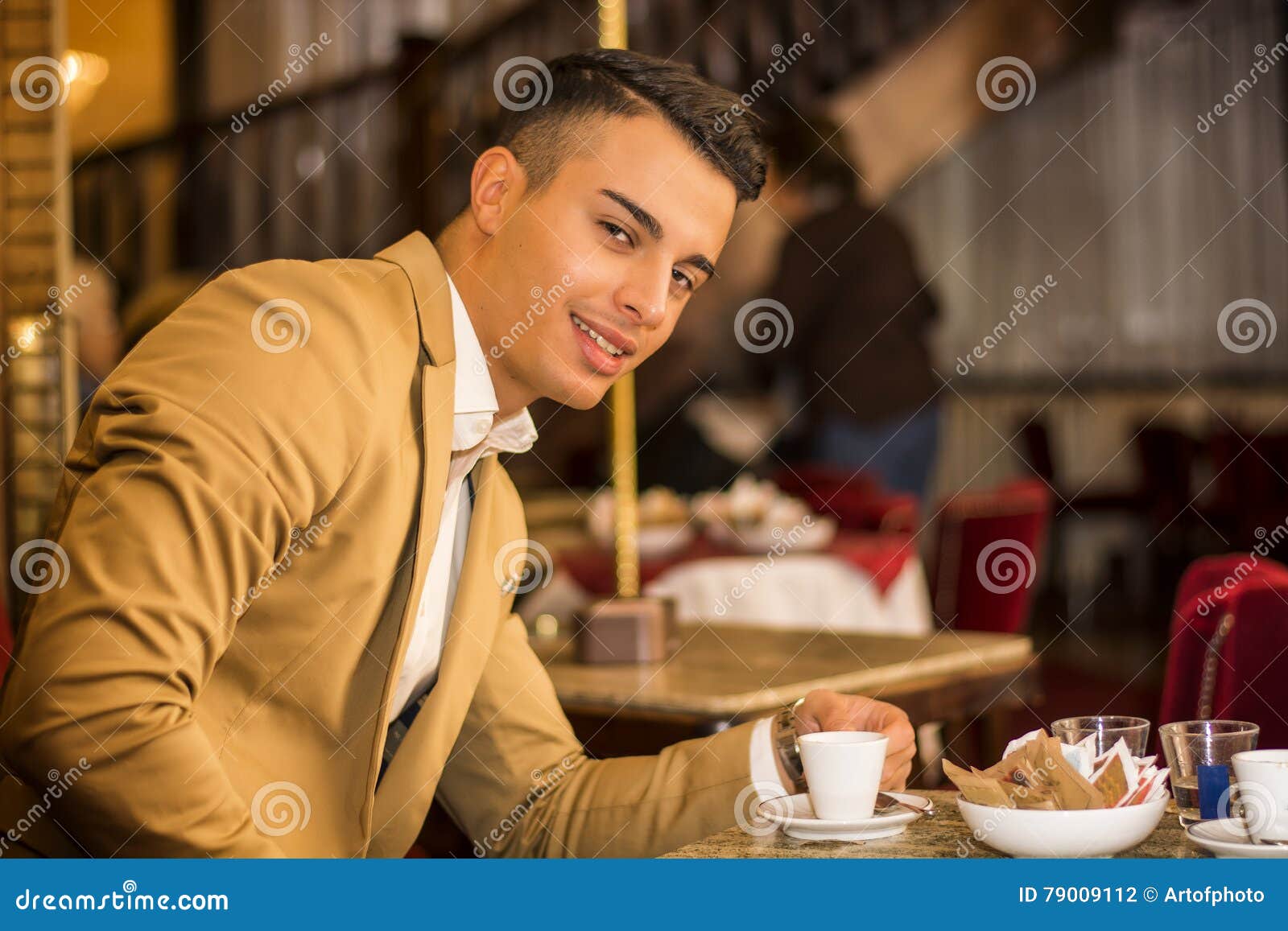Handsome man in cafe stock photo. Image of beige, espresso - 79009112