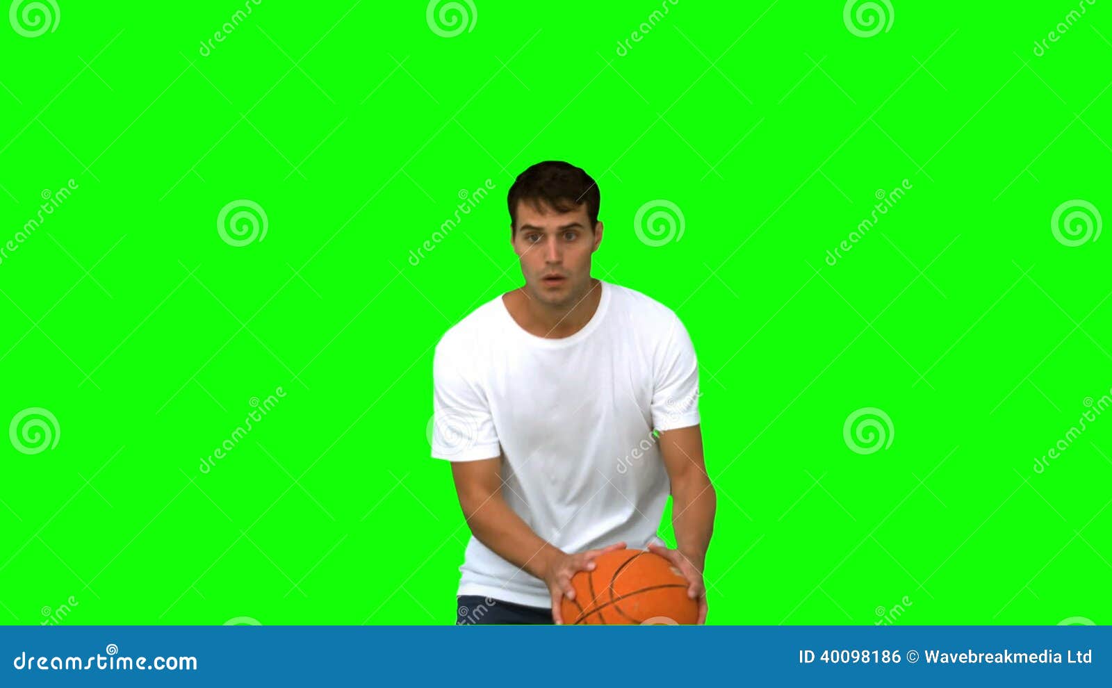 Handsome Man Catching and Throwing a Basketball on Green Screen Stock ...