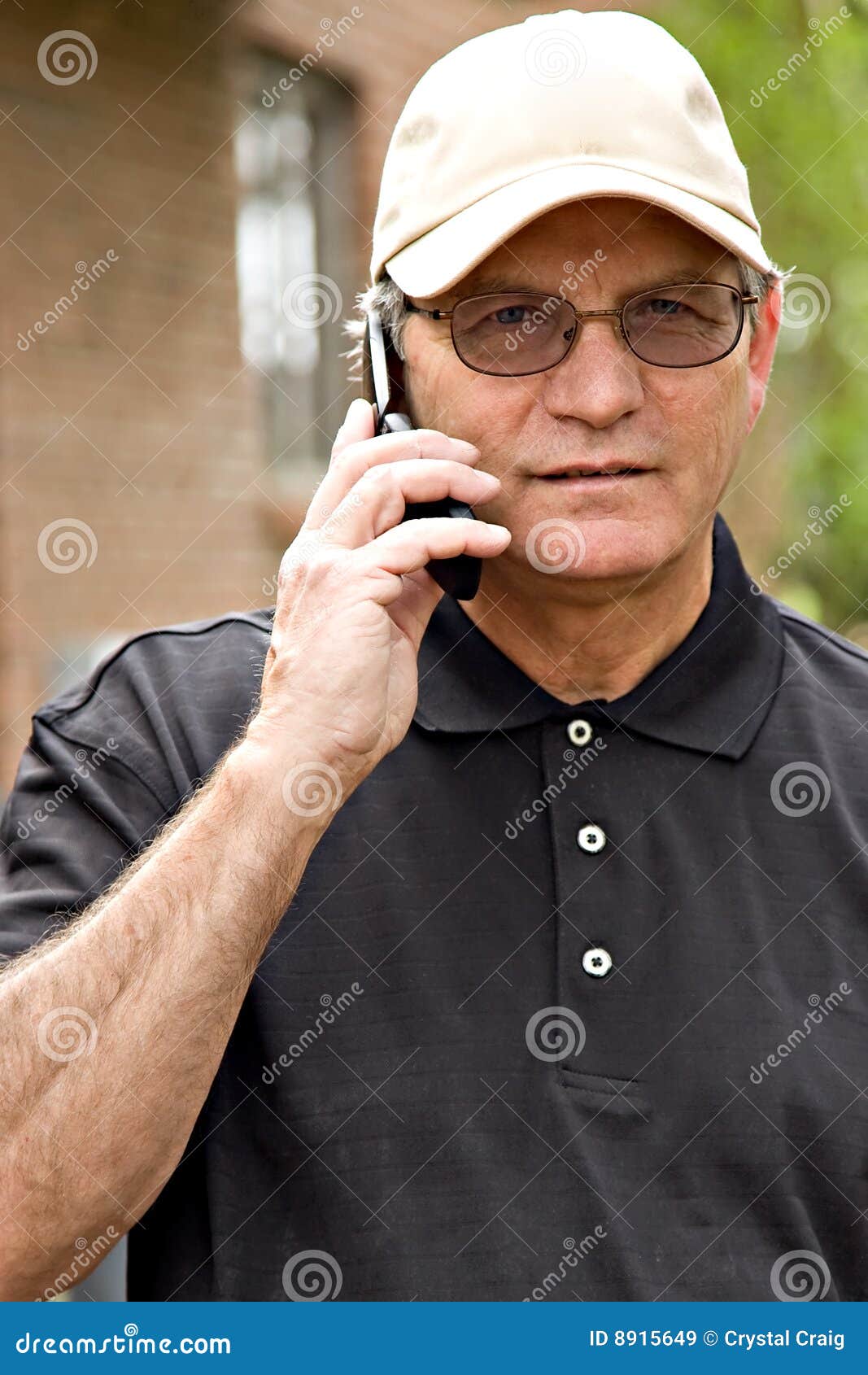 Handsome Man on Cell Phone stock image. Image of talking - 8915649