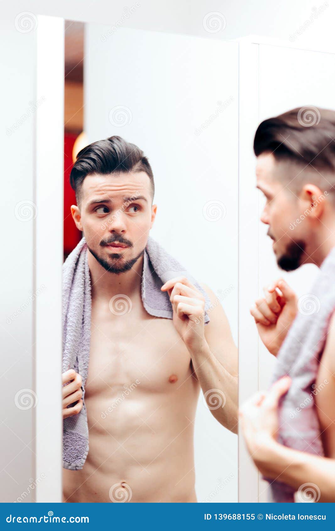 Handsome Man Checking Himself in the Mirror Stock Image - Image of ...