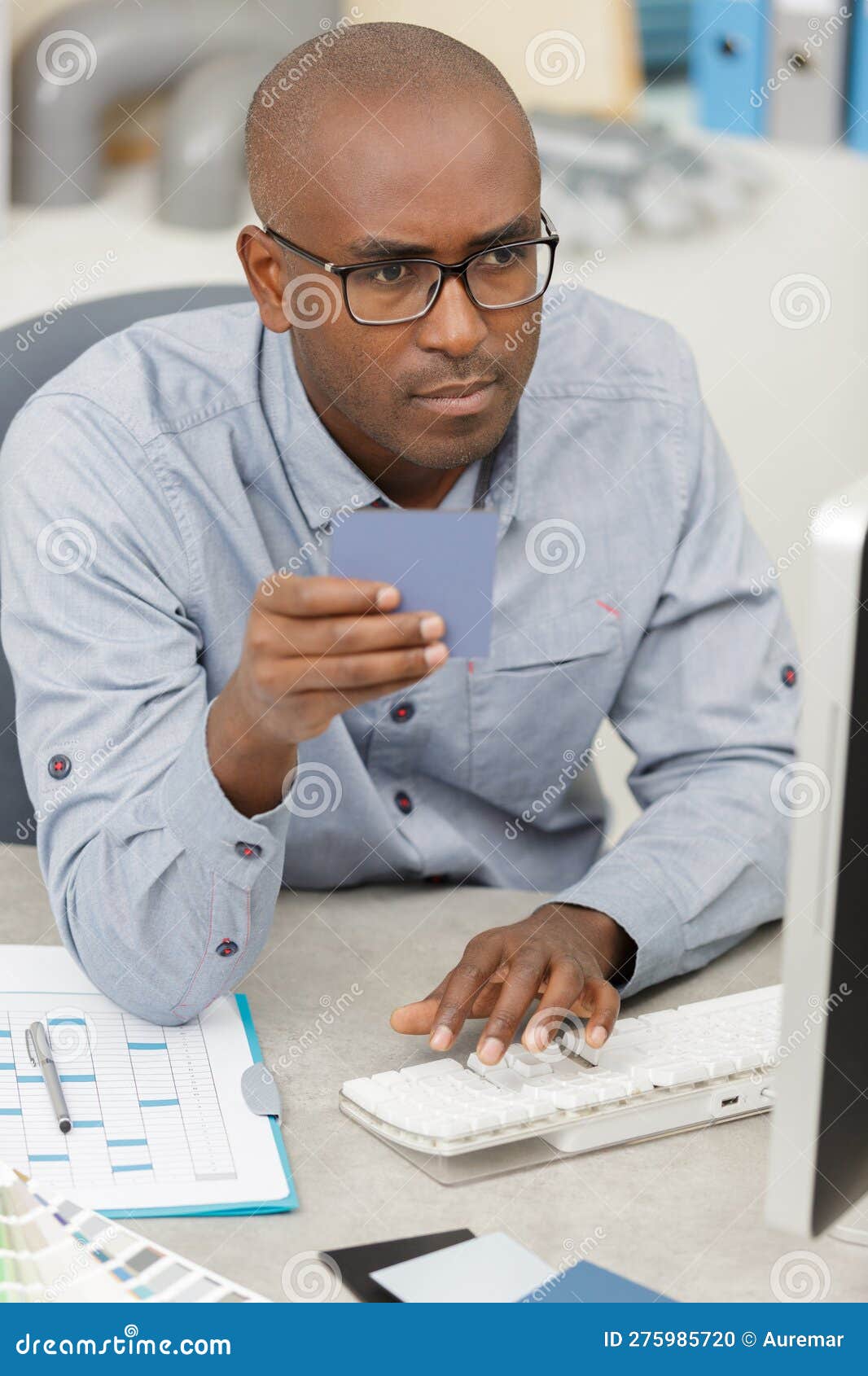 Handsome Man Checking Reference in Computer Stock Photo - Image of ...
