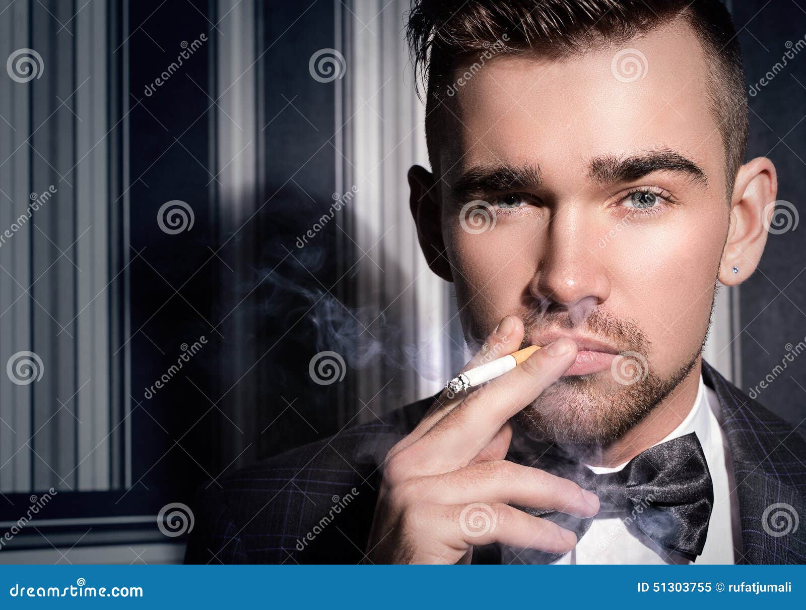 Handsome Man with a Cigarette Stock Image - Image of eyes, calm: 51303755