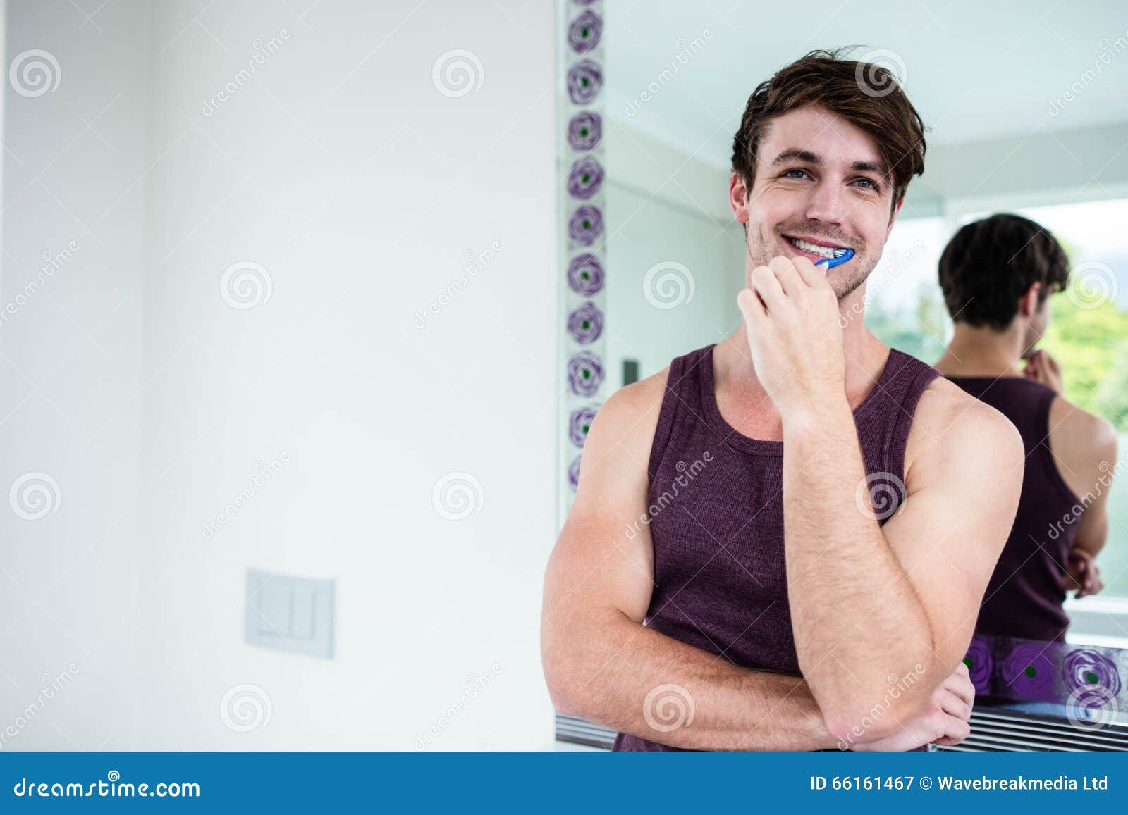 Handsome Man Cleaning His Teeth Stock Image - Image of body, domestic ...