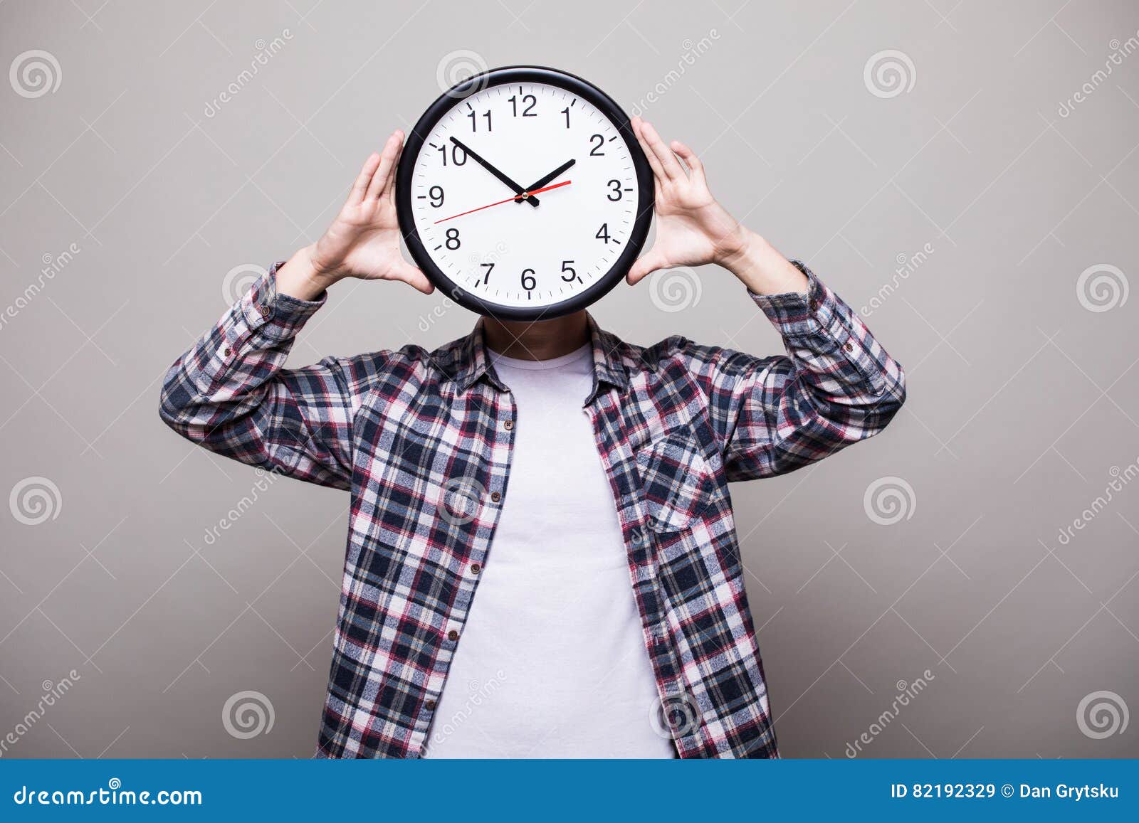 Handsome man with clock stock image. Image of deadline - 82192329