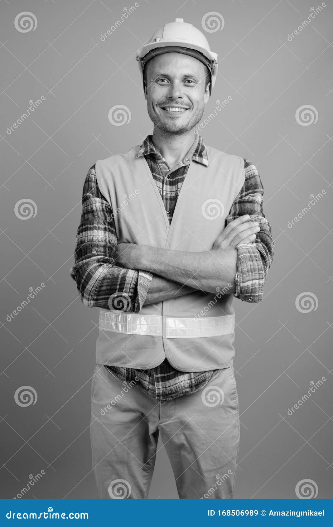 Handsome Man Construction Worker Against Gray Background Stock Image ...