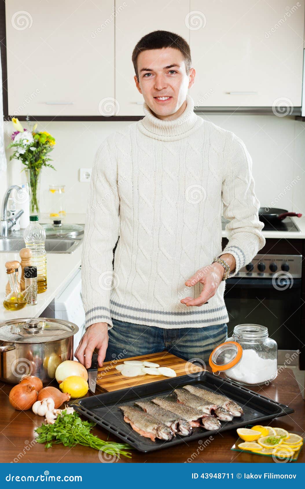 Handsome Man Cooking Fish in Baking Sheet Stock Image - Image of ...