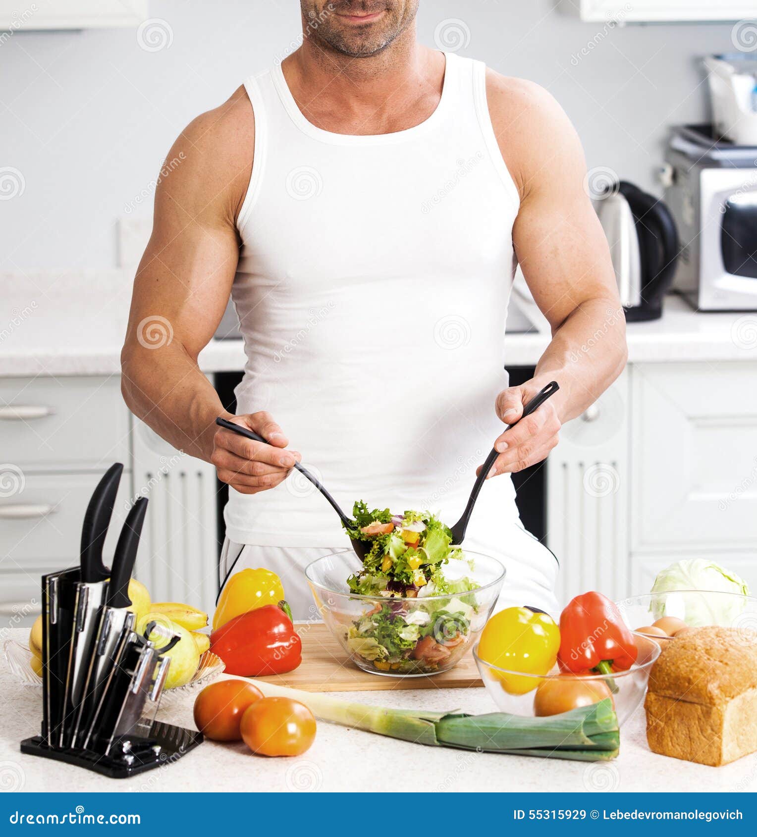Handsome Man Cooking at Home` Stock Image - Image of home, happy: 55315929