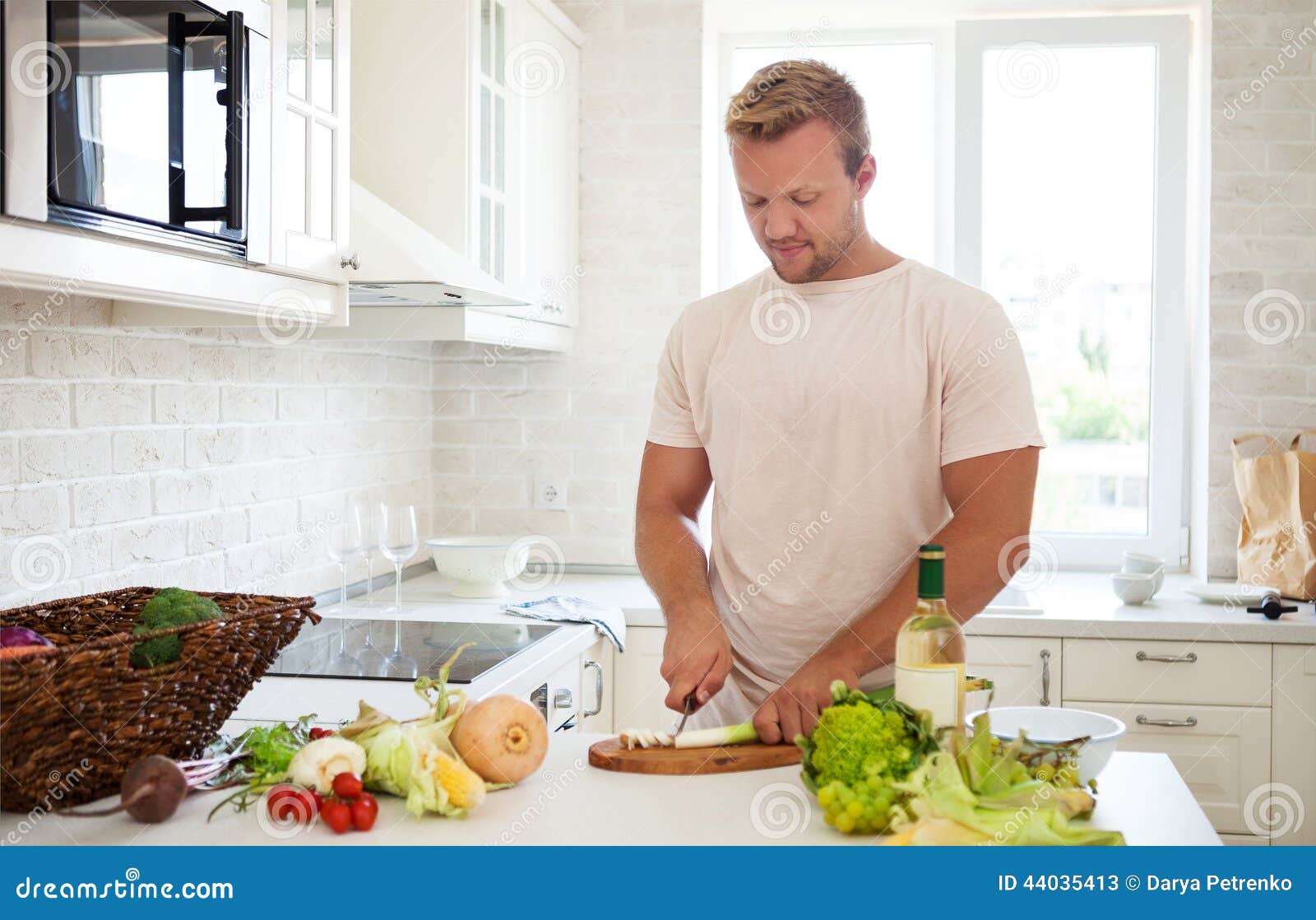 Handsome Man Cooking at Home Preparing Salad in Kitchen Stock Image ...
