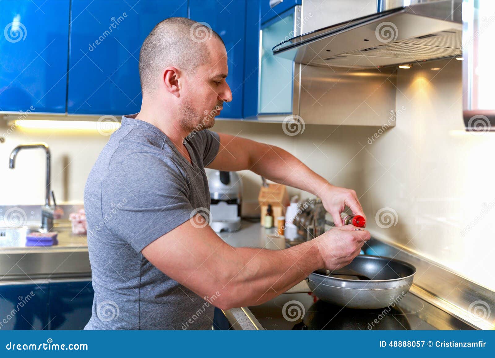 Handsome Man Cooking in the Kitchen Stock Image - Image of person ...