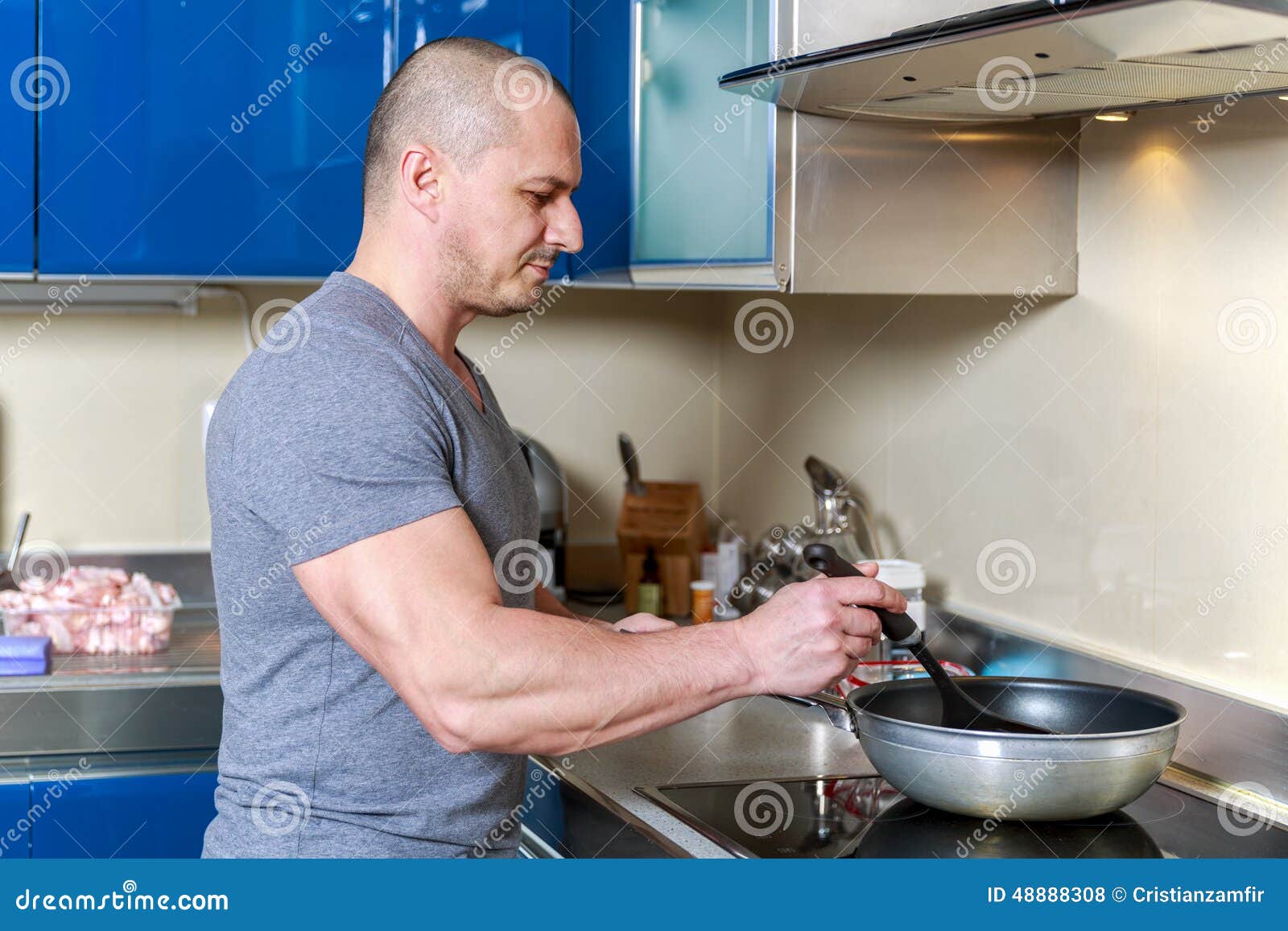 Handsome Man Cooking in the Kitchen Stock Photo - Image of handsome ...