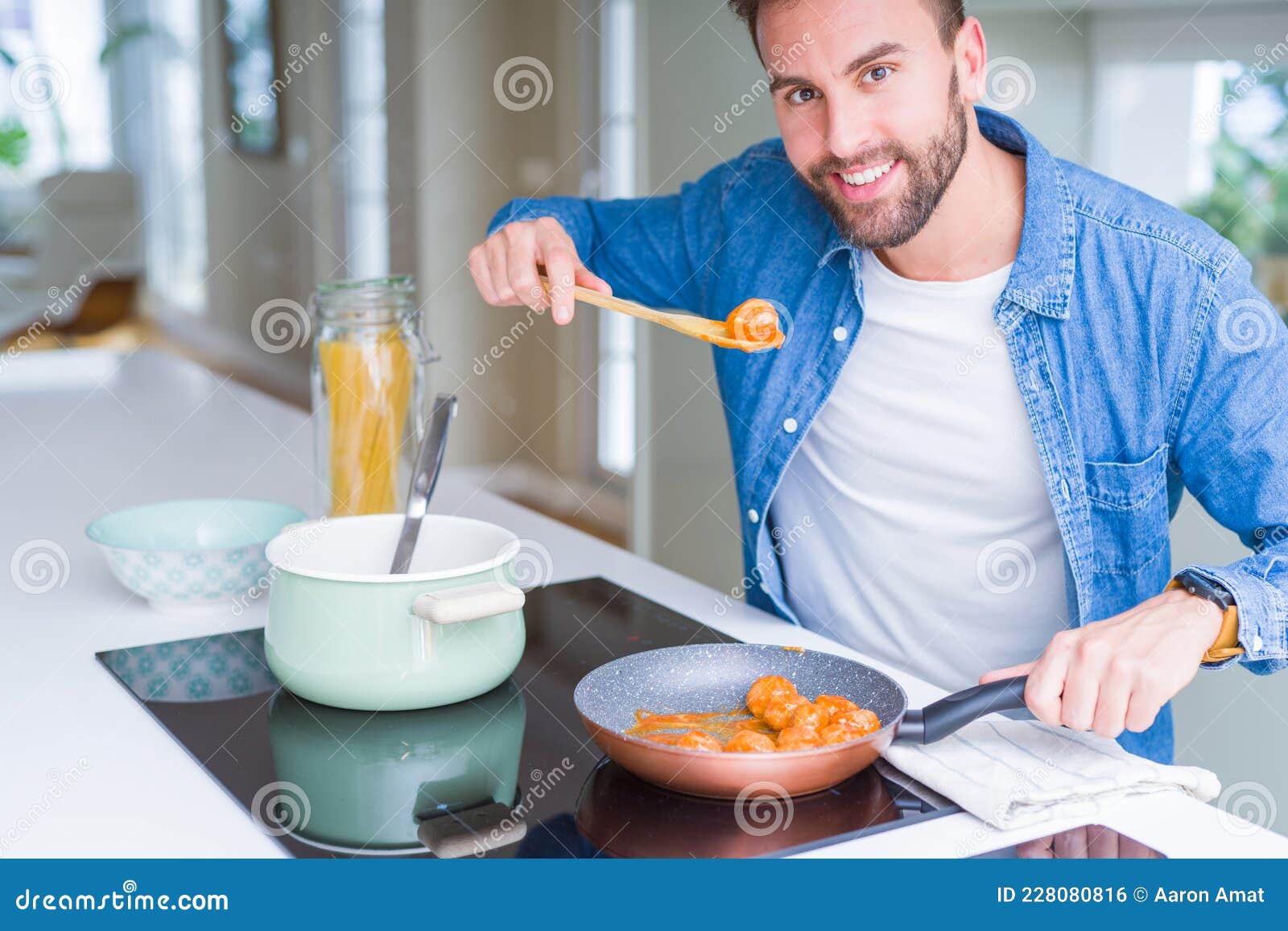 Handsome Man Cooking Pasta at Home Stock Photo - Image of happy ...
