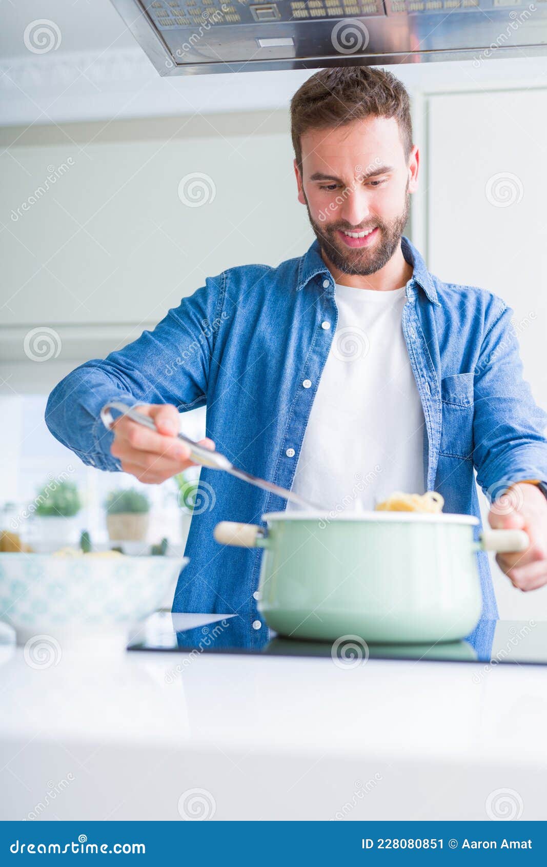 Handsome Man Cooking Pasta at Home Stock Image - Image of eating ...