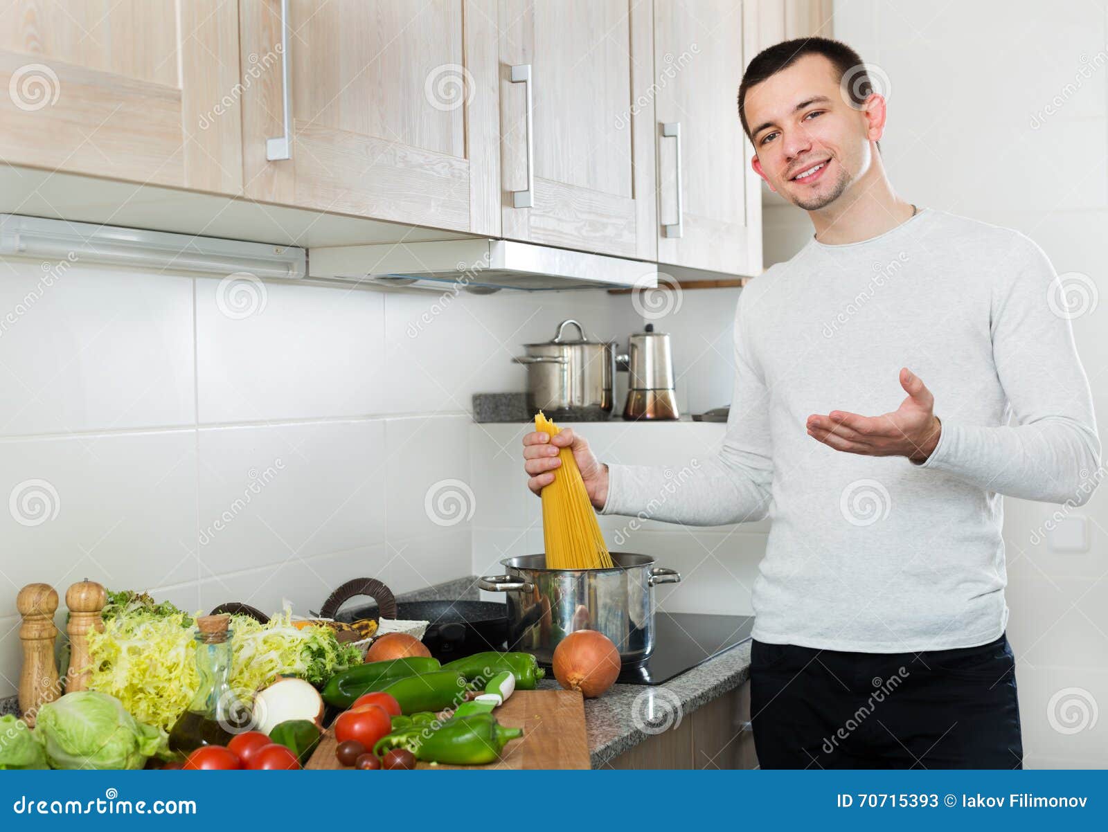 Handsome Man Cooks Spaghetti Stock Image - Image of male, domestic ...