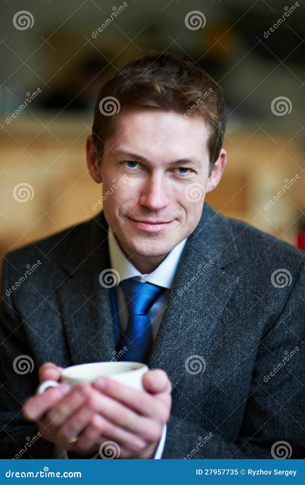 Handsome Man with Cup of Tea Stock Image - Image of suit, hands: 27957735