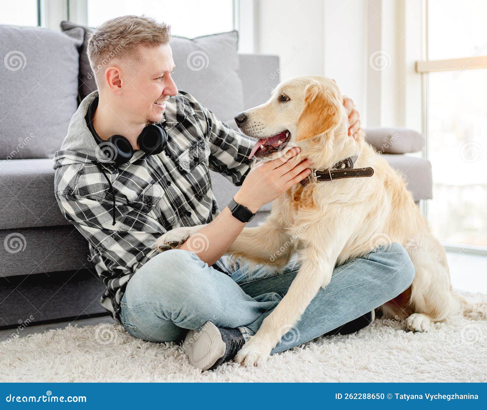 Handsome man with cute dog stock photo. Image of animal - 262288650