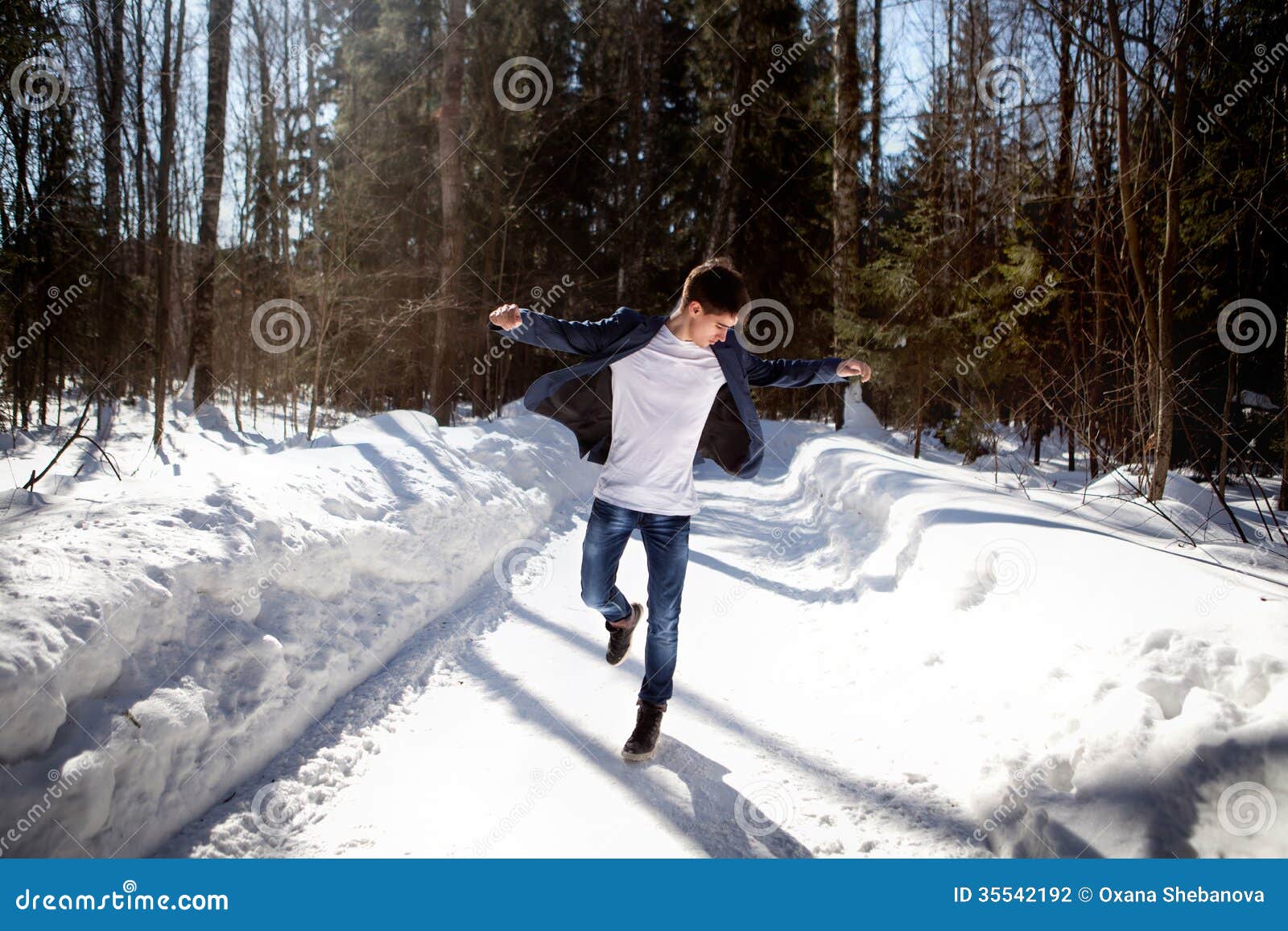 Handsome Man Dancing on Snow Background Stock Photo - Image of ...