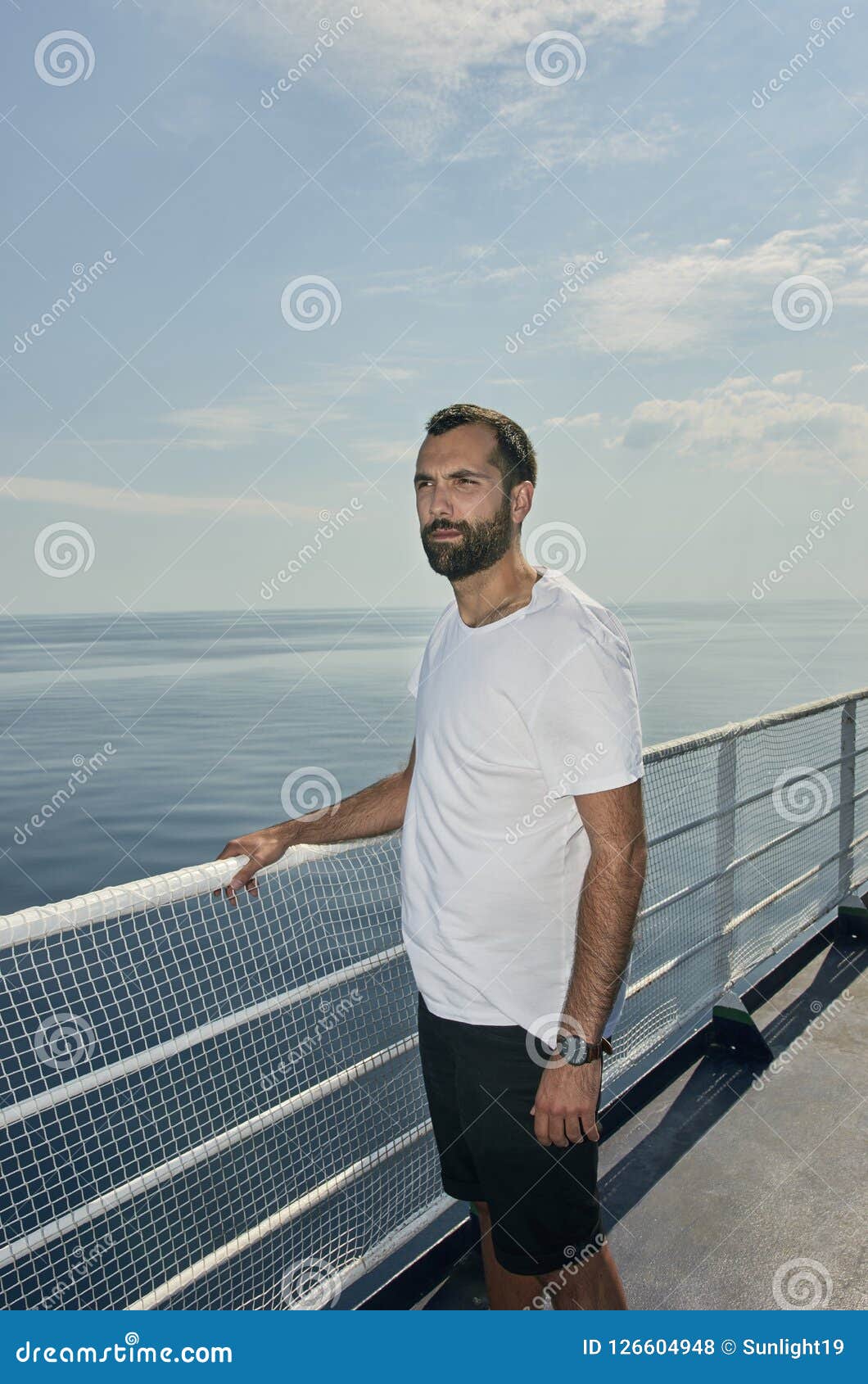 Handsome Man on the Deck of a Ship during Holiday. Stock Photo - Image ...