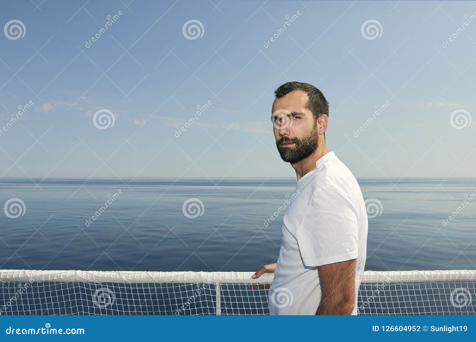 Handsome Man on the Deck of a Ship during Holiday. Stock Photo - Image ...