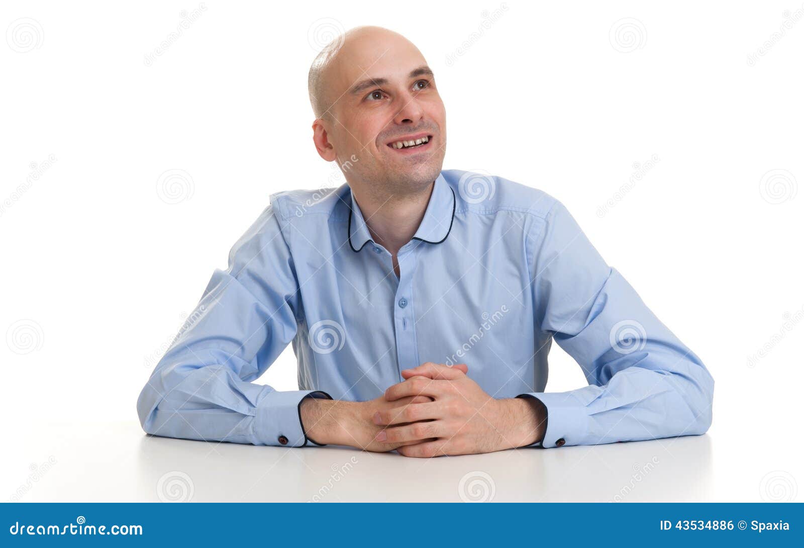 Handsome Man at a Desk Looking Up Stock Photo - Image of business ...