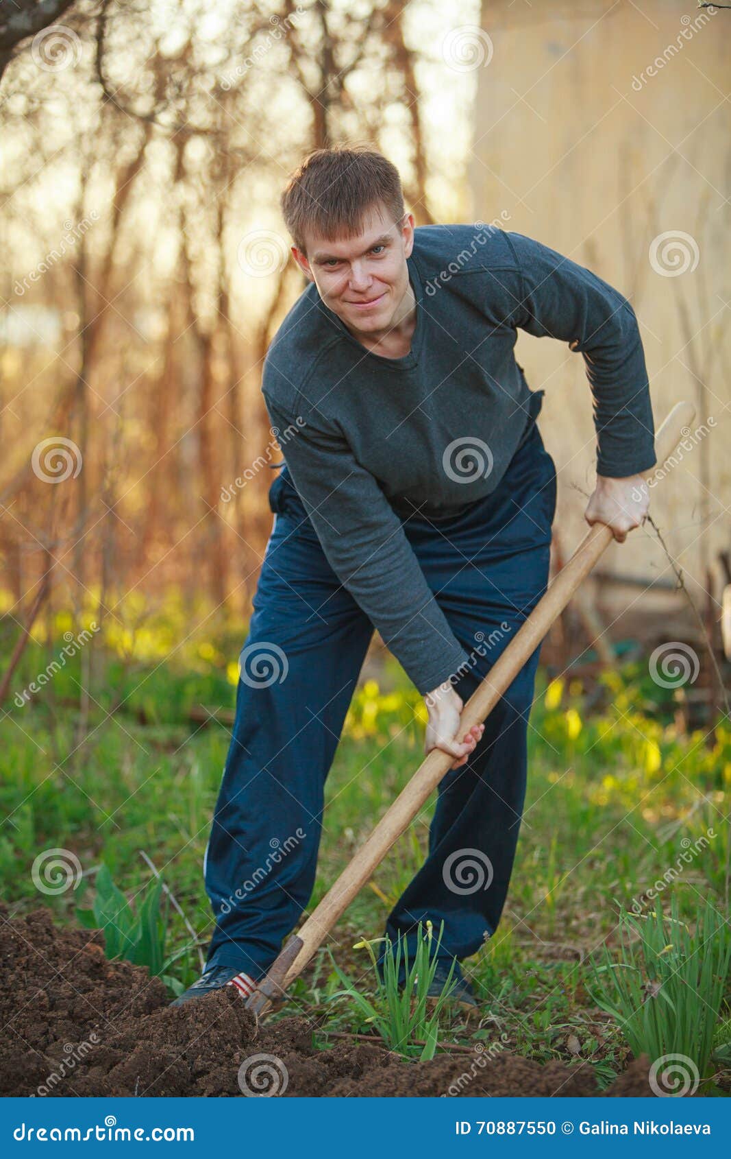 Handsome man digging stock photo. Image of male, handsome - 70887550