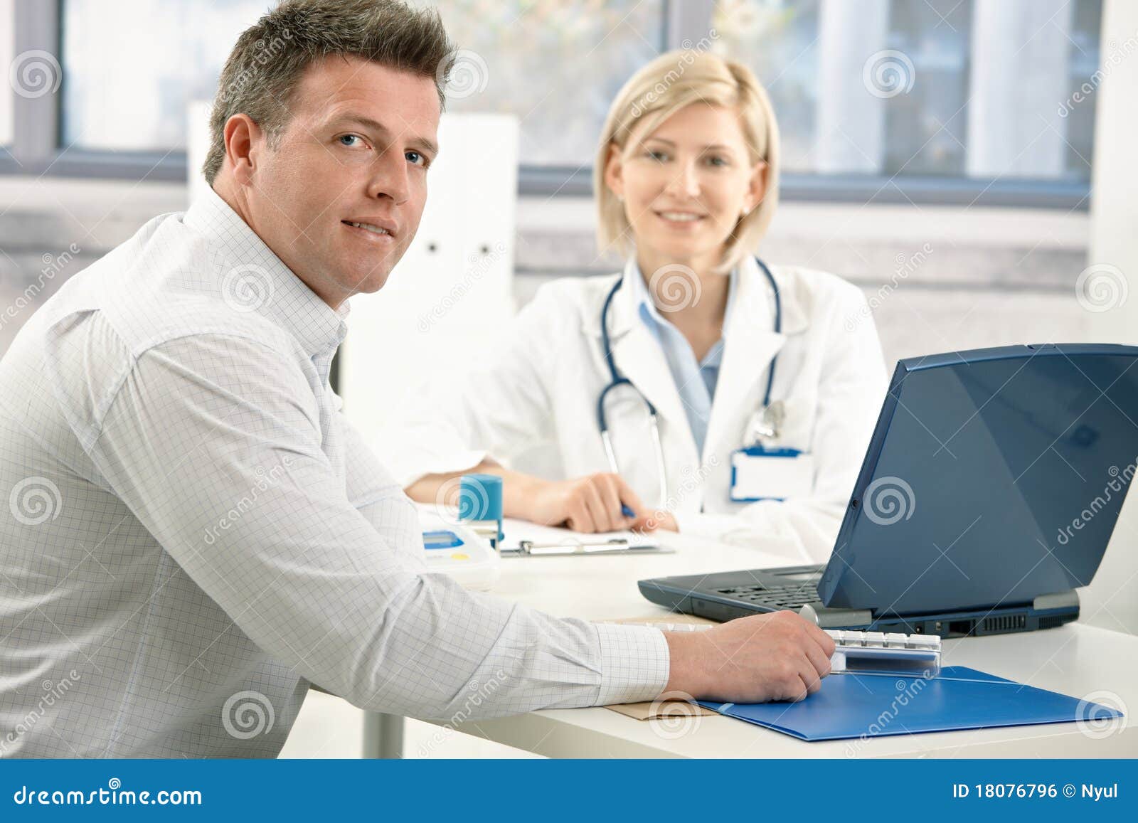 Handsome man at doctor stock photo. Image of helping - 18076796