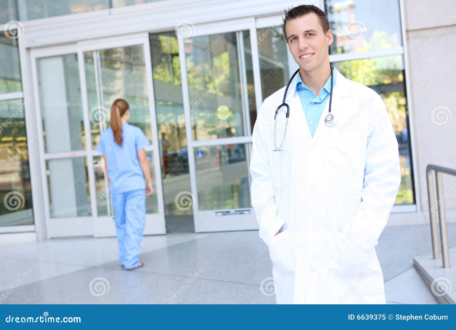 Handsome Man Doctor at Hospital Stock Image - Image of smile, medicine ...