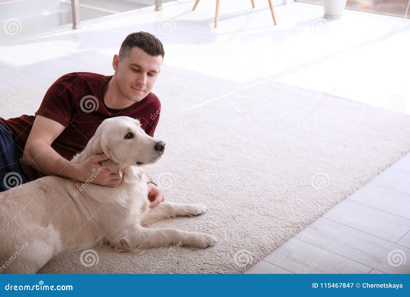 Handsome Man with Dog Lying on Carpet Stock Image - Image of floor ...