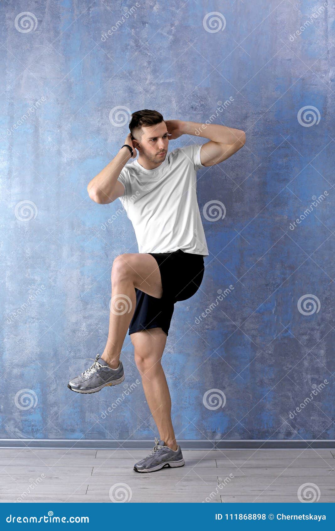 Handsome Man Doing Bicycle Crunch Stock Photo - Image of muscles, color ...