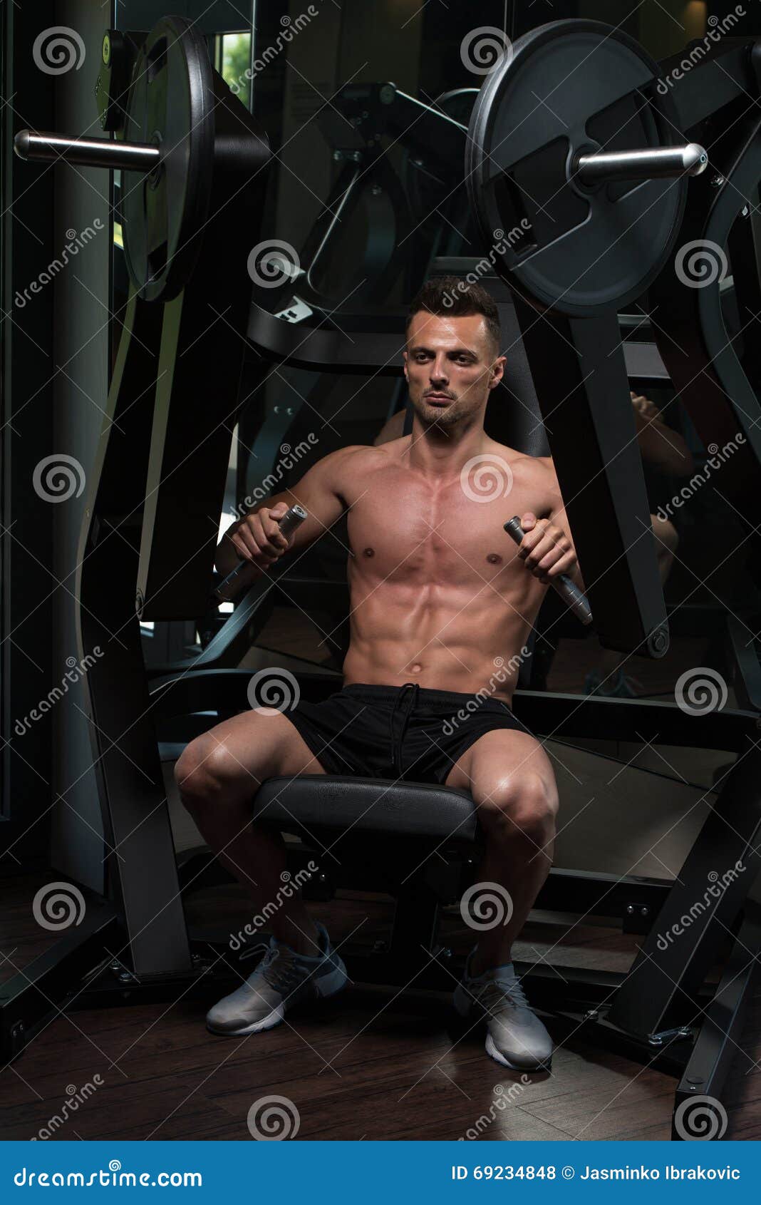 Handsome Man Doing Heavy Weight Exercise for Chest Stock Photo - Image ...